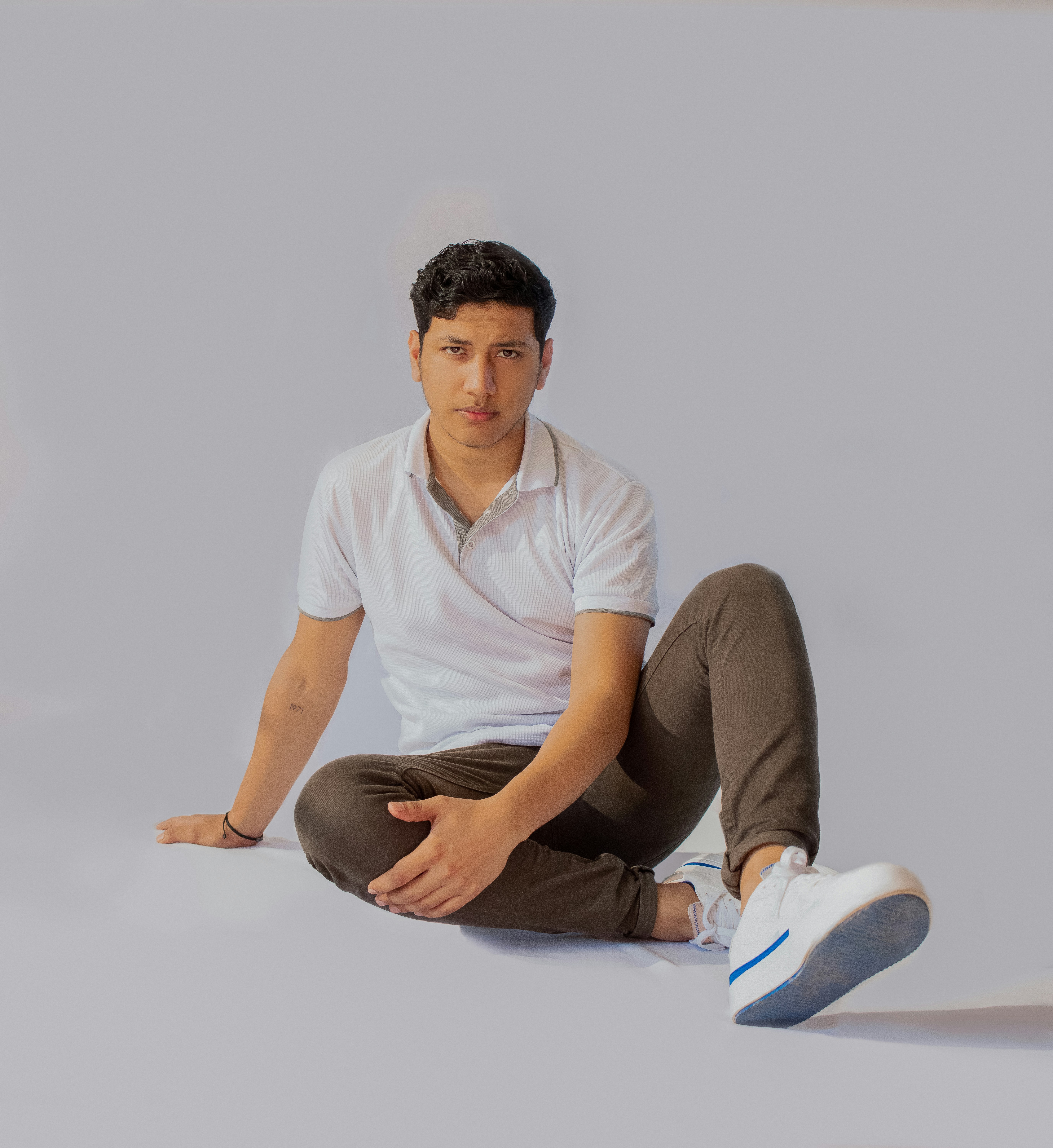 Direct Gaze in a Quiet Studio Portrait