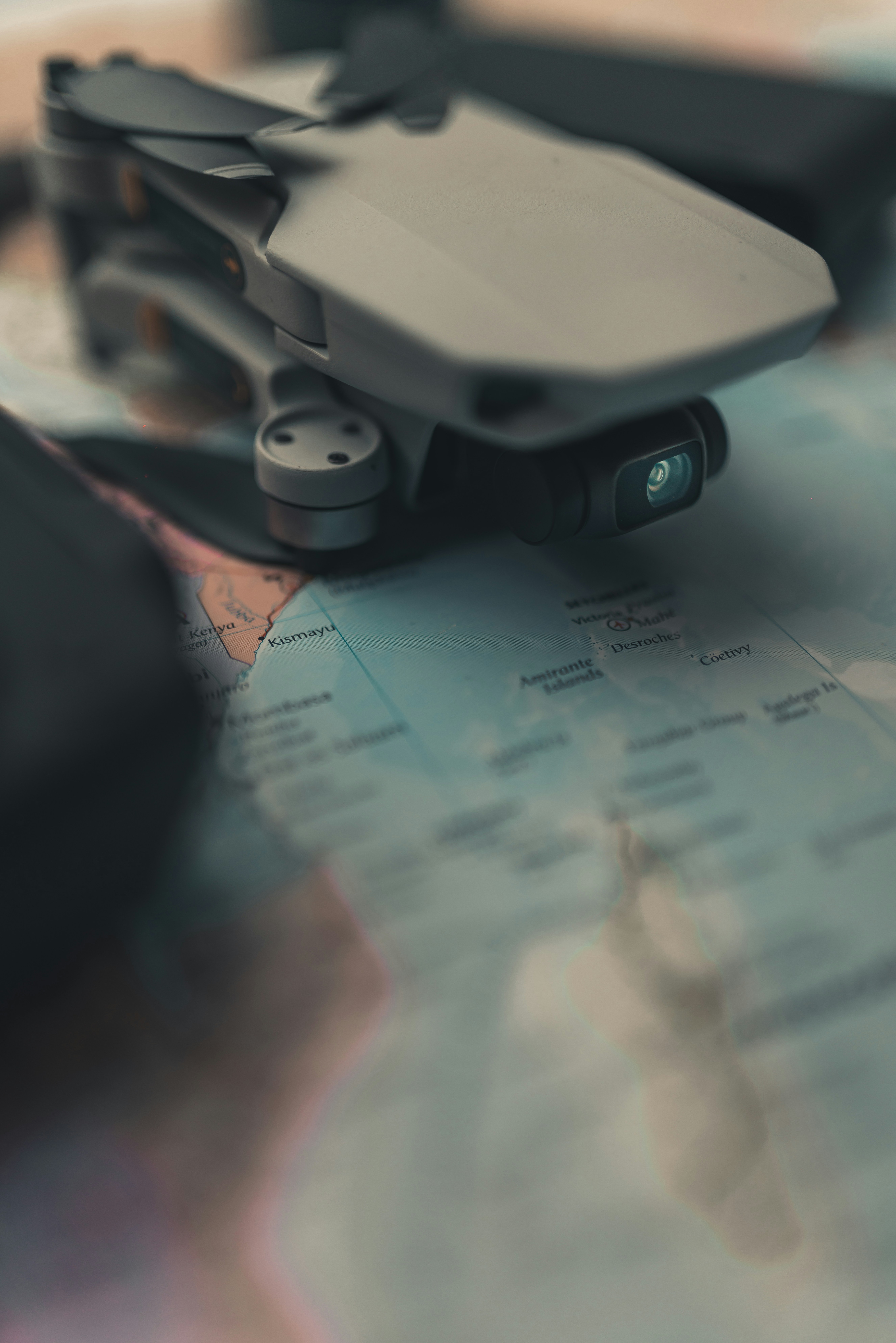 A camera sitting on top of a map photo – Free Dji drone Image on Unsplash