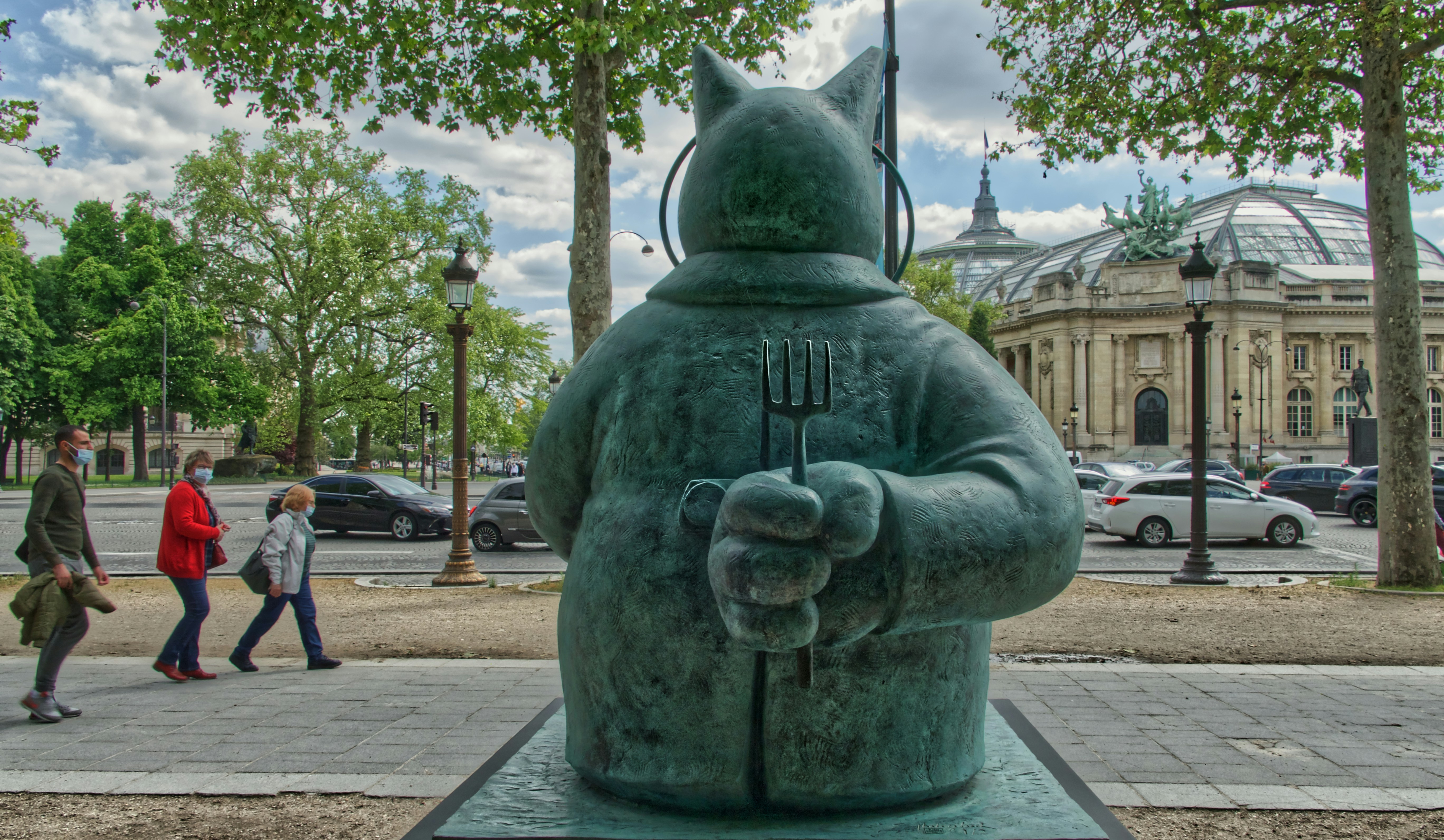 Bronze Cat-Warrior Stands Guard Over a City Park