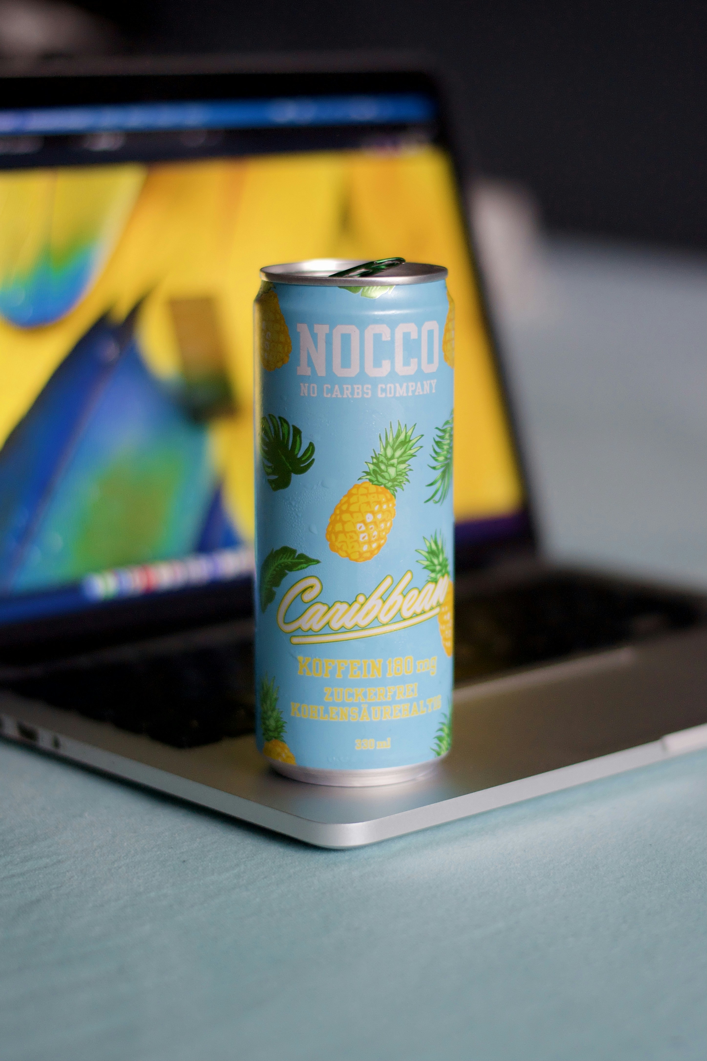A can of coca cola sitting on top of a laptop photo – Free Pineapple ...