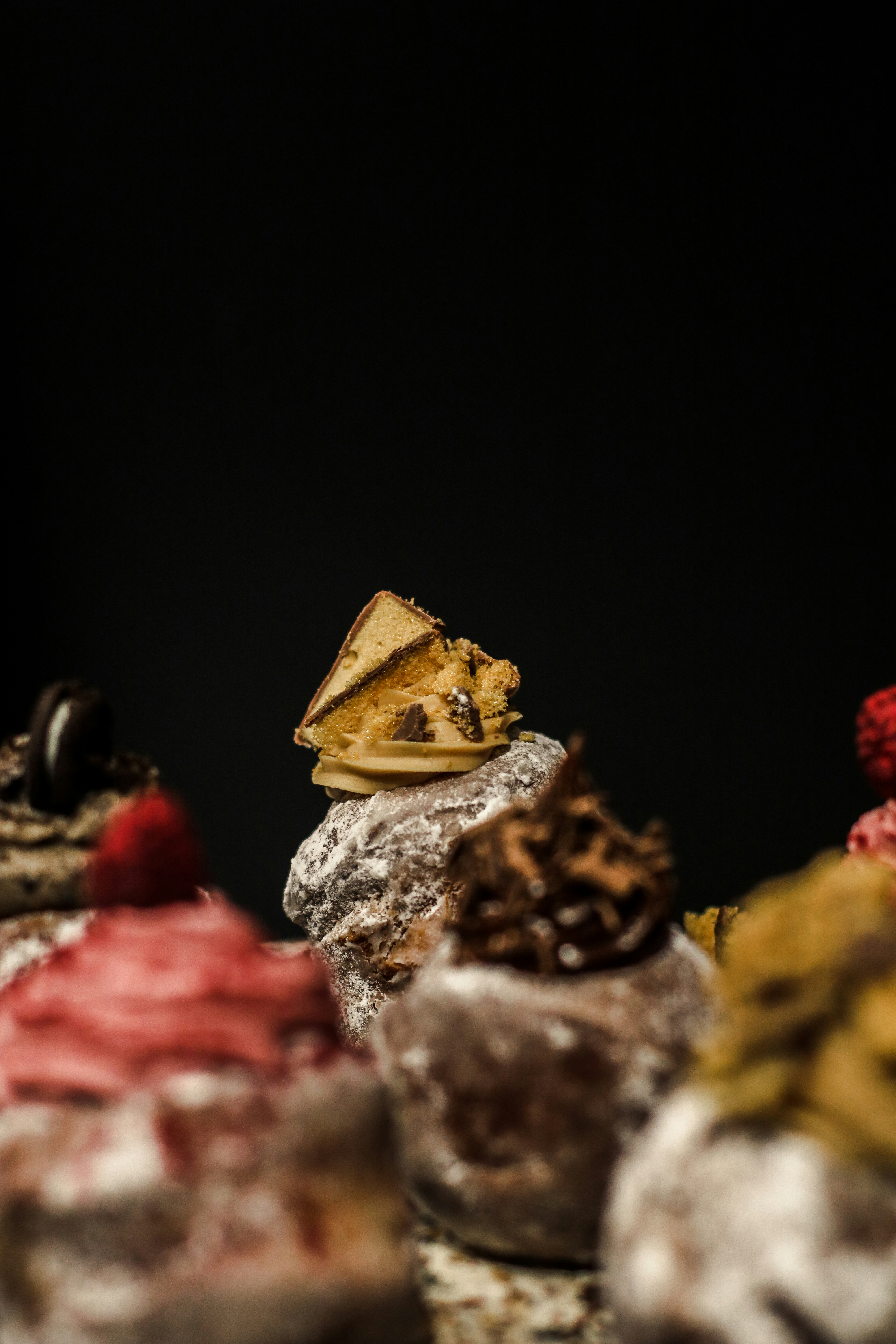 brown and white cake on white and red textile