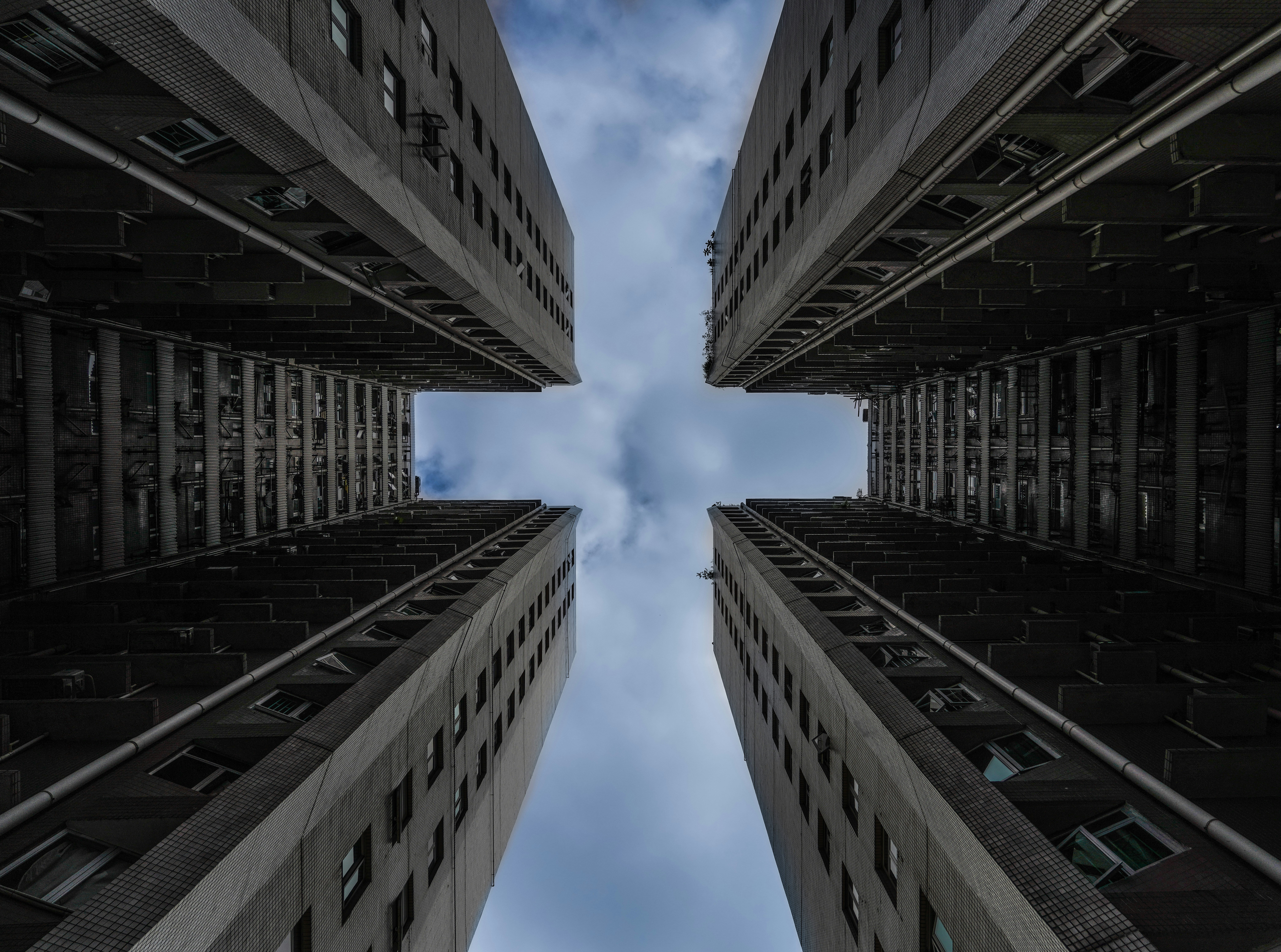 Looking up at tall buildings from the ground photo – Free Shatin Image ...