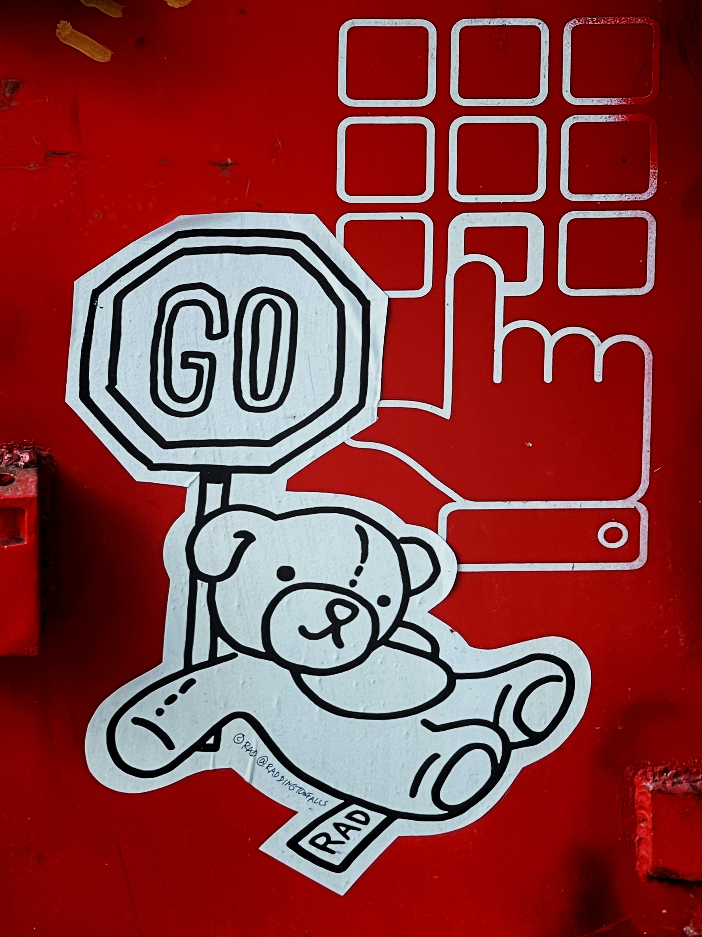 Teddy Bear Stop Sign on Red Street of Playful Graffiti
