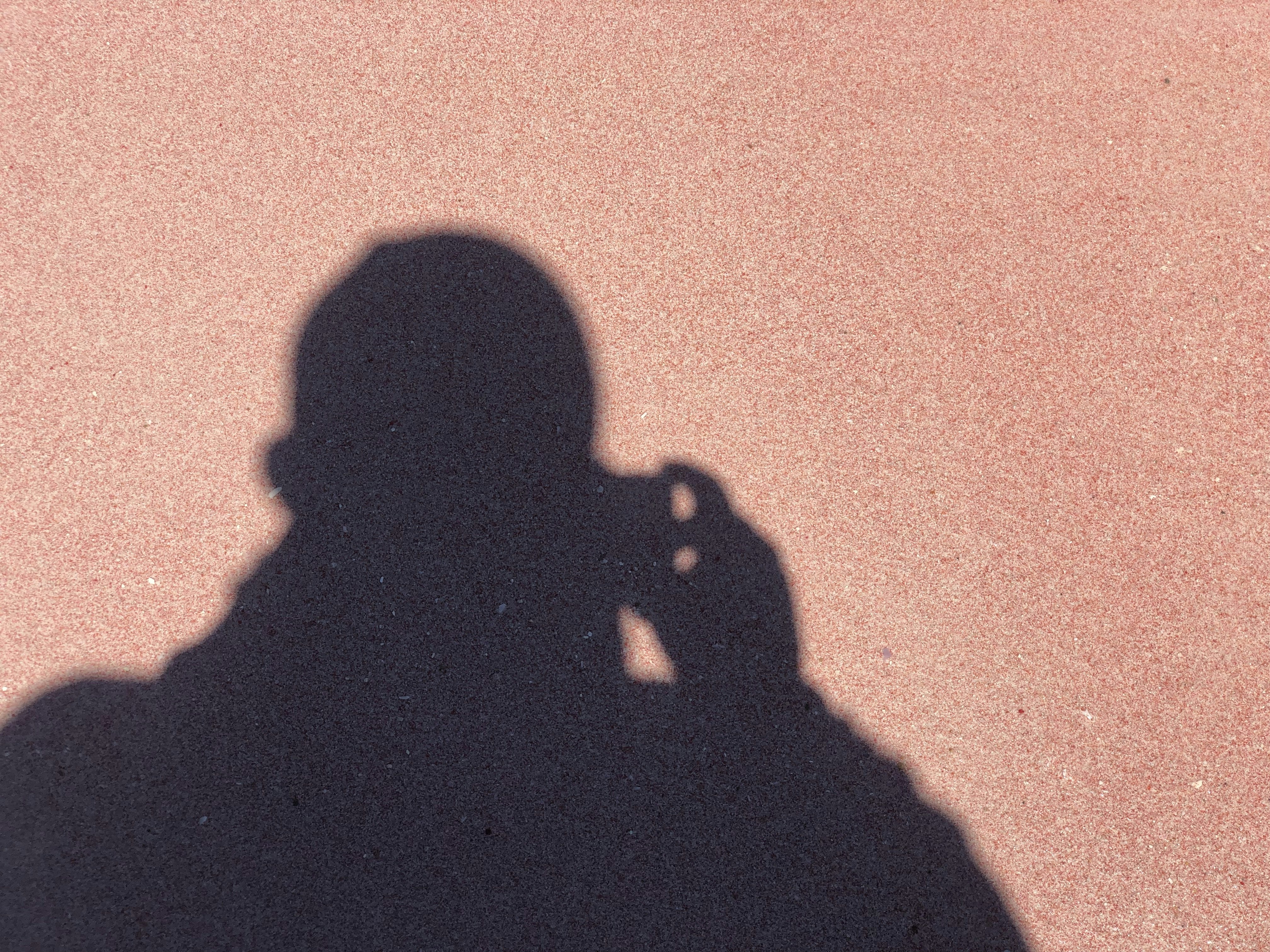 A shadow of a person talking on a cell phone photo – Free Shadow Image ...