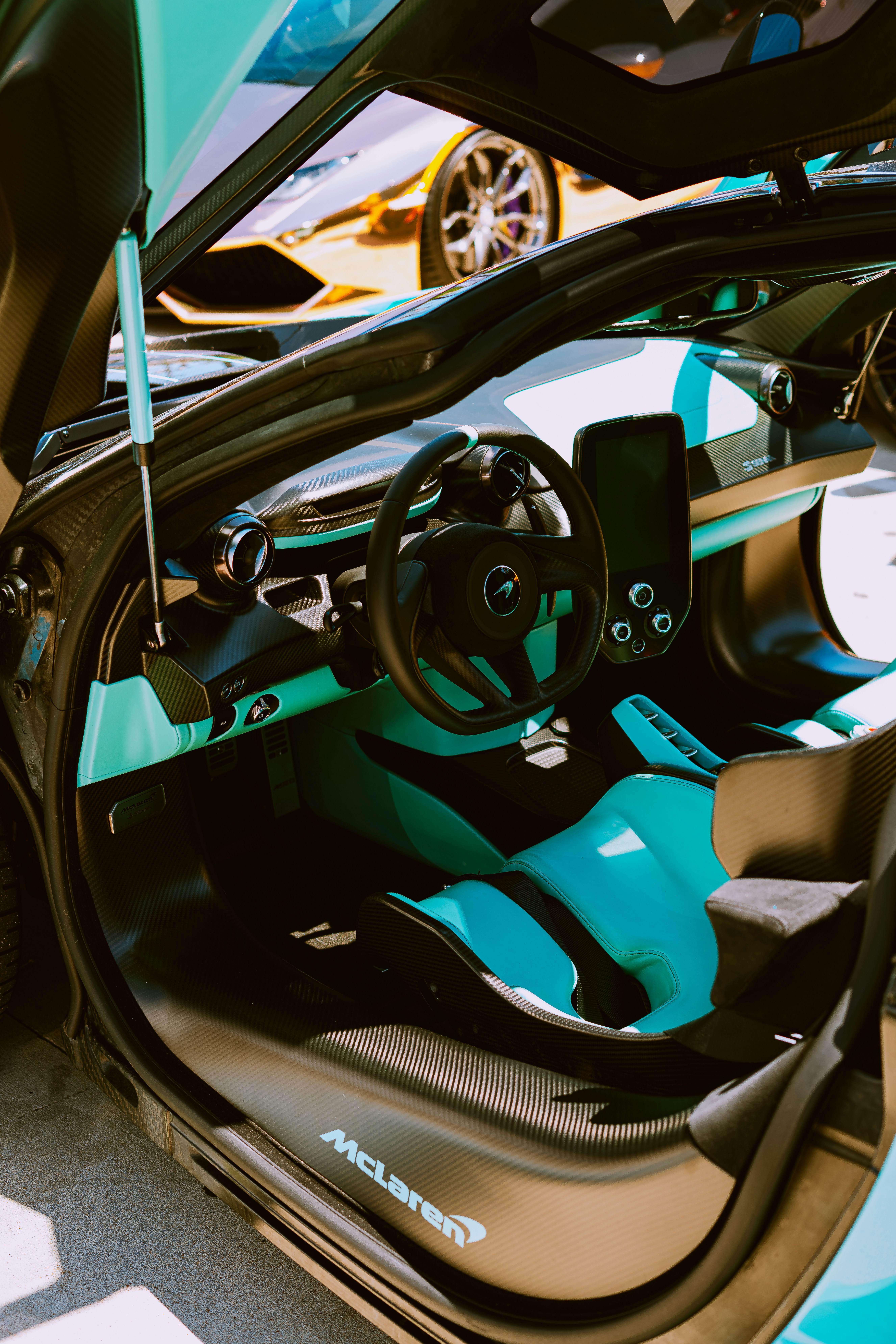 the interior of a car with a steering wheel