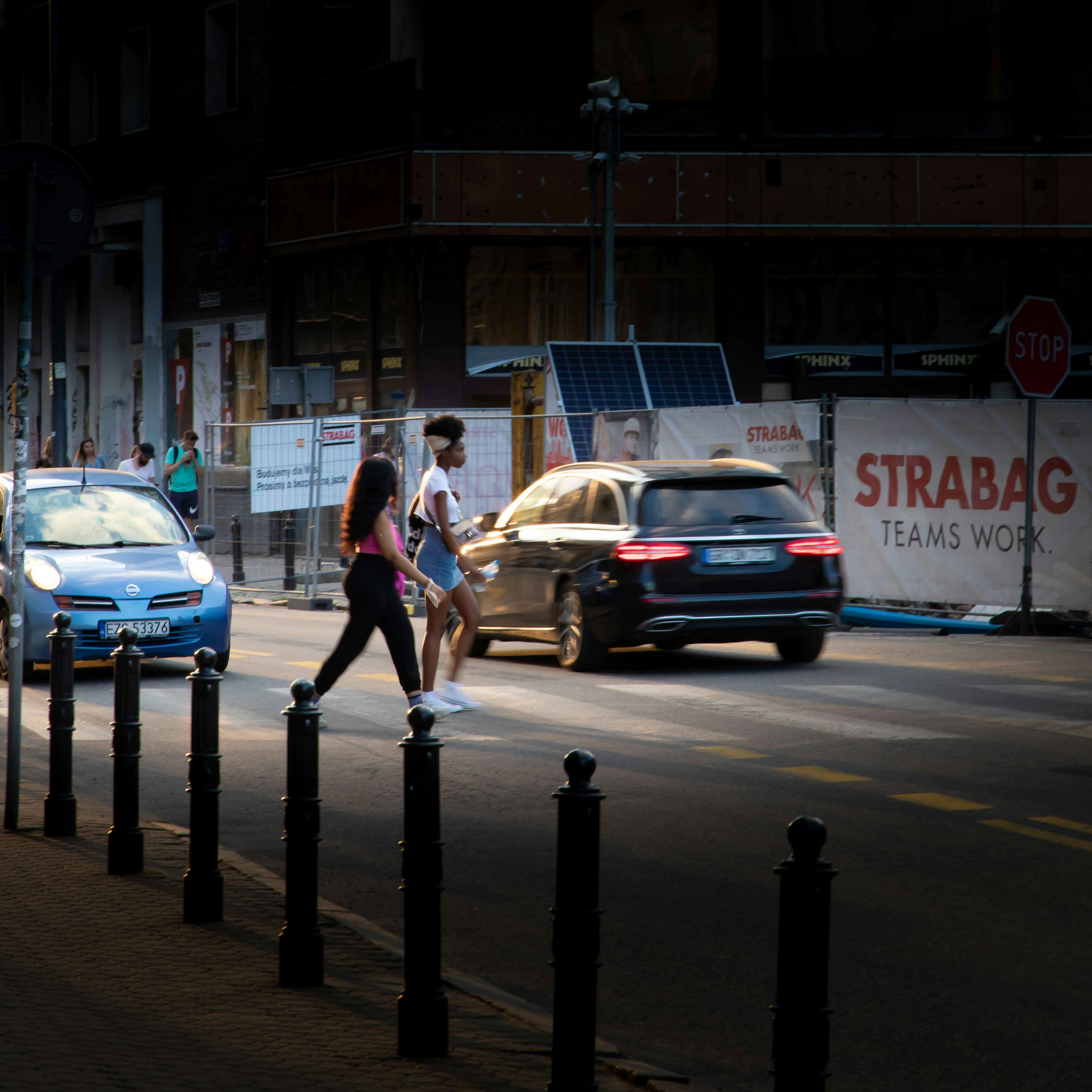 Crosswalk Confluence: Pedestrians Meet Moving Traffic at Dusk