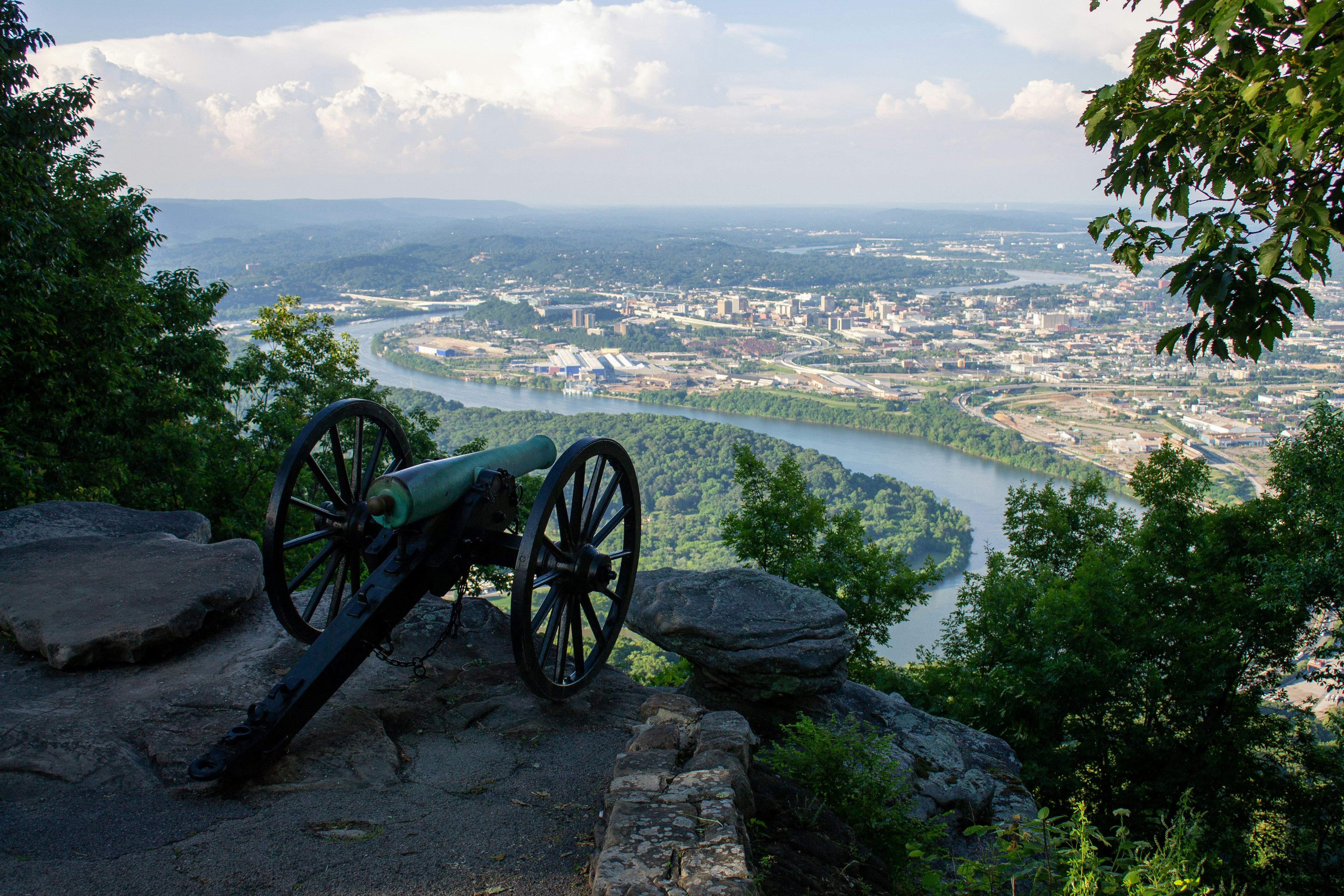 Overlooked Sentinel: A Historic Cannon Amidst the Cliffside Vista