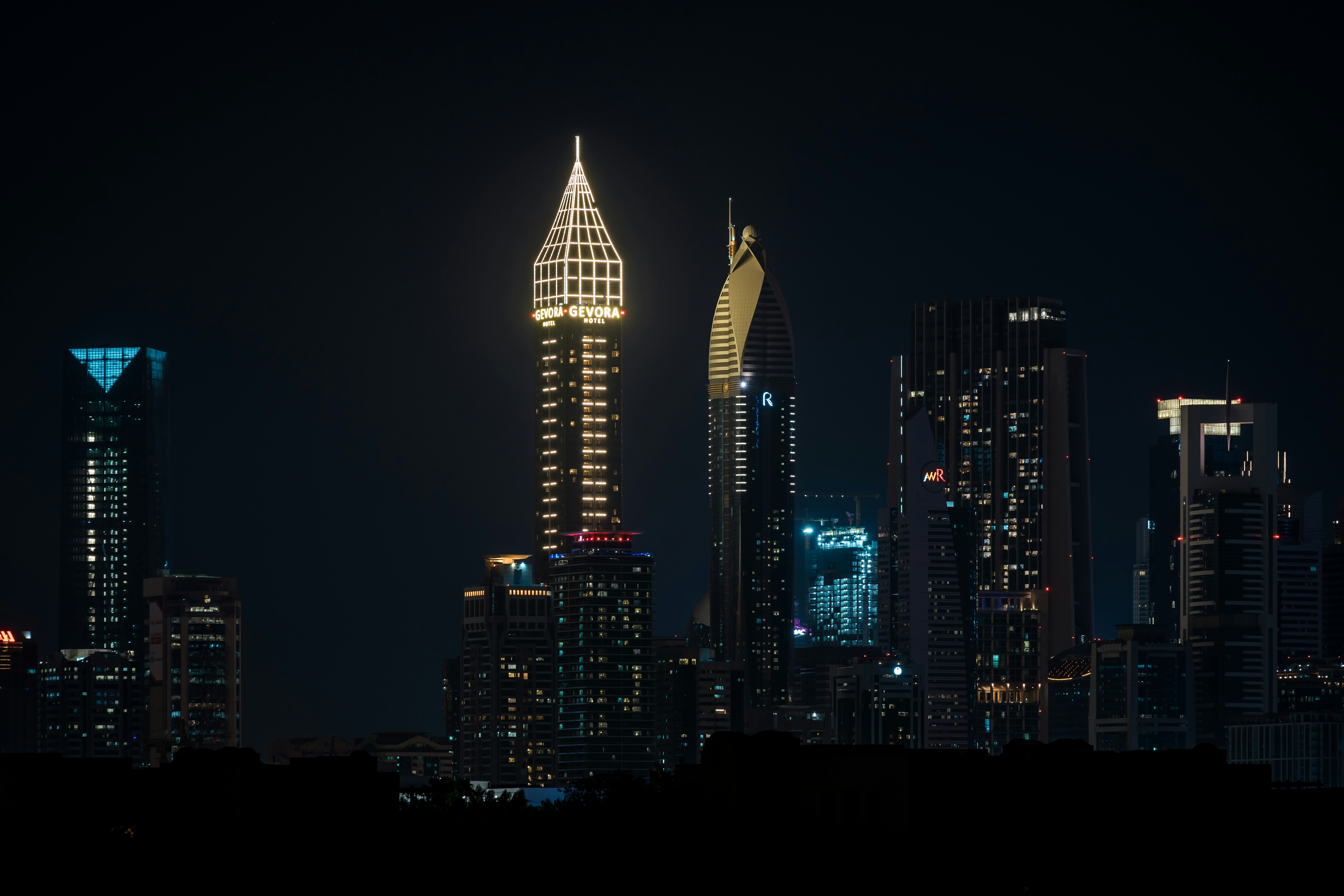 High rise building during night time photo – Free Building Image on ...