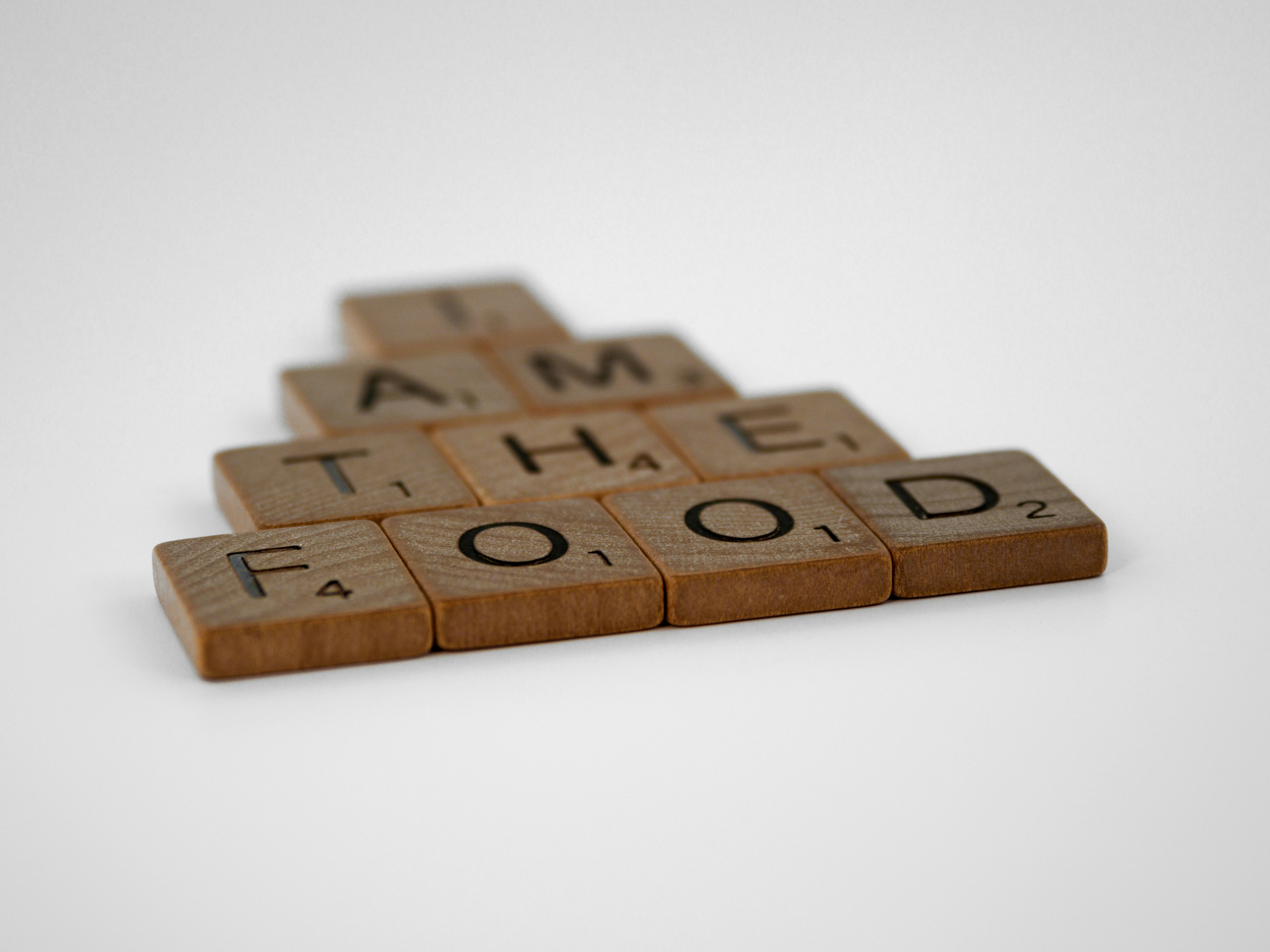 FOOD on White: A Minimal Stack of Wooden Letter Tiles
