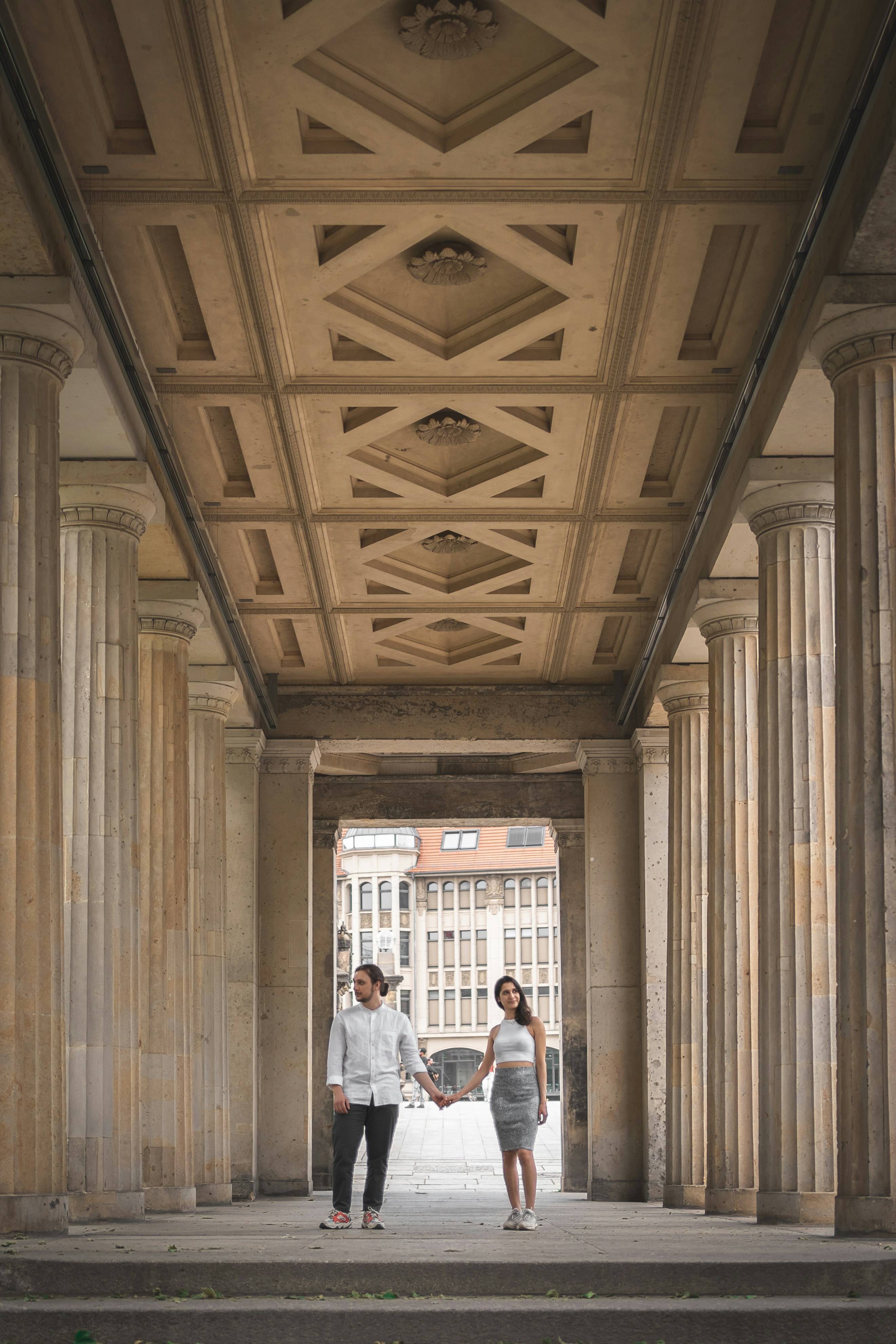 Handshake at the Threshold of a Marble Colonnade