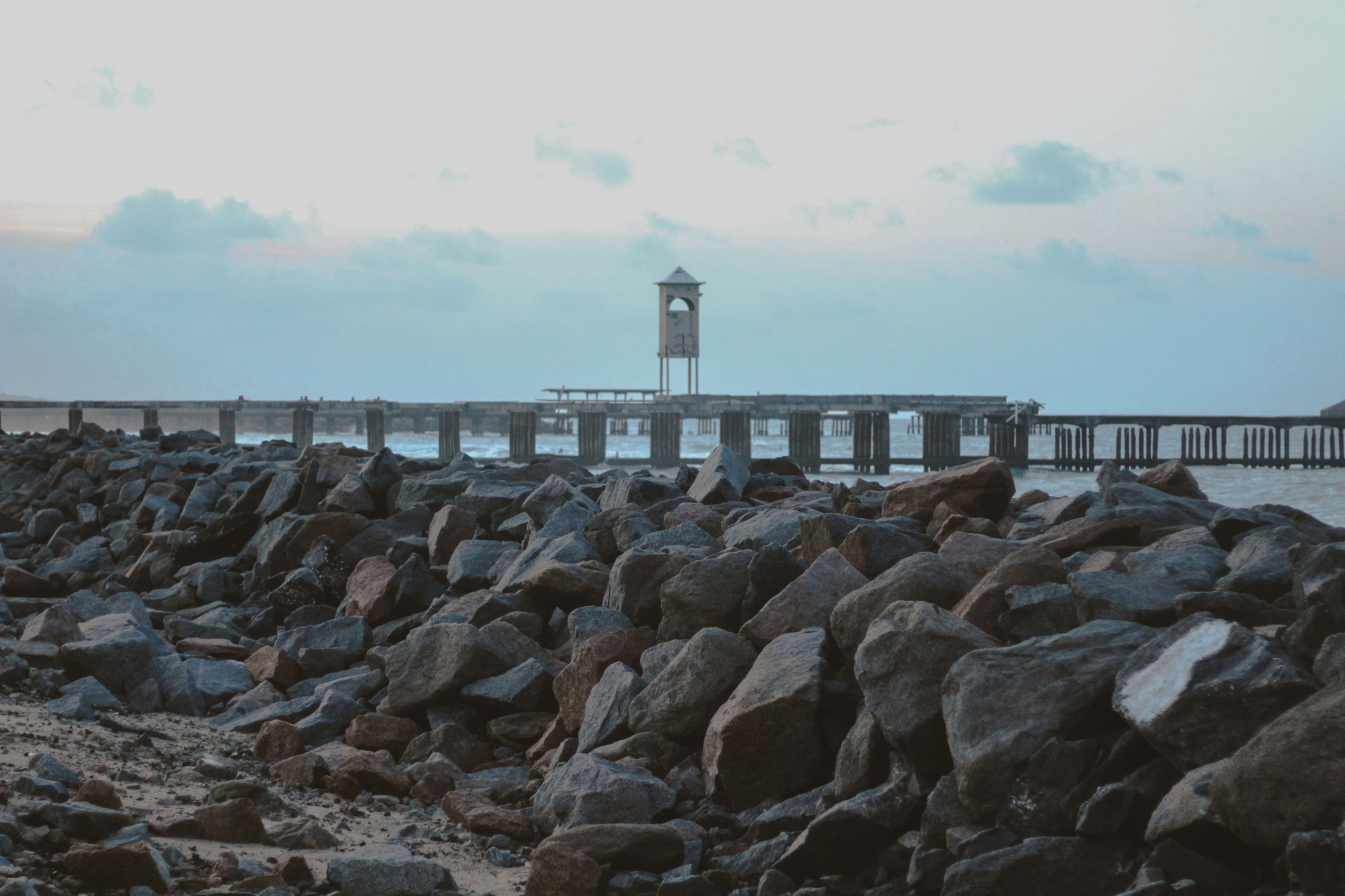 White and gray concrete dock under white sky during daytime photo ...