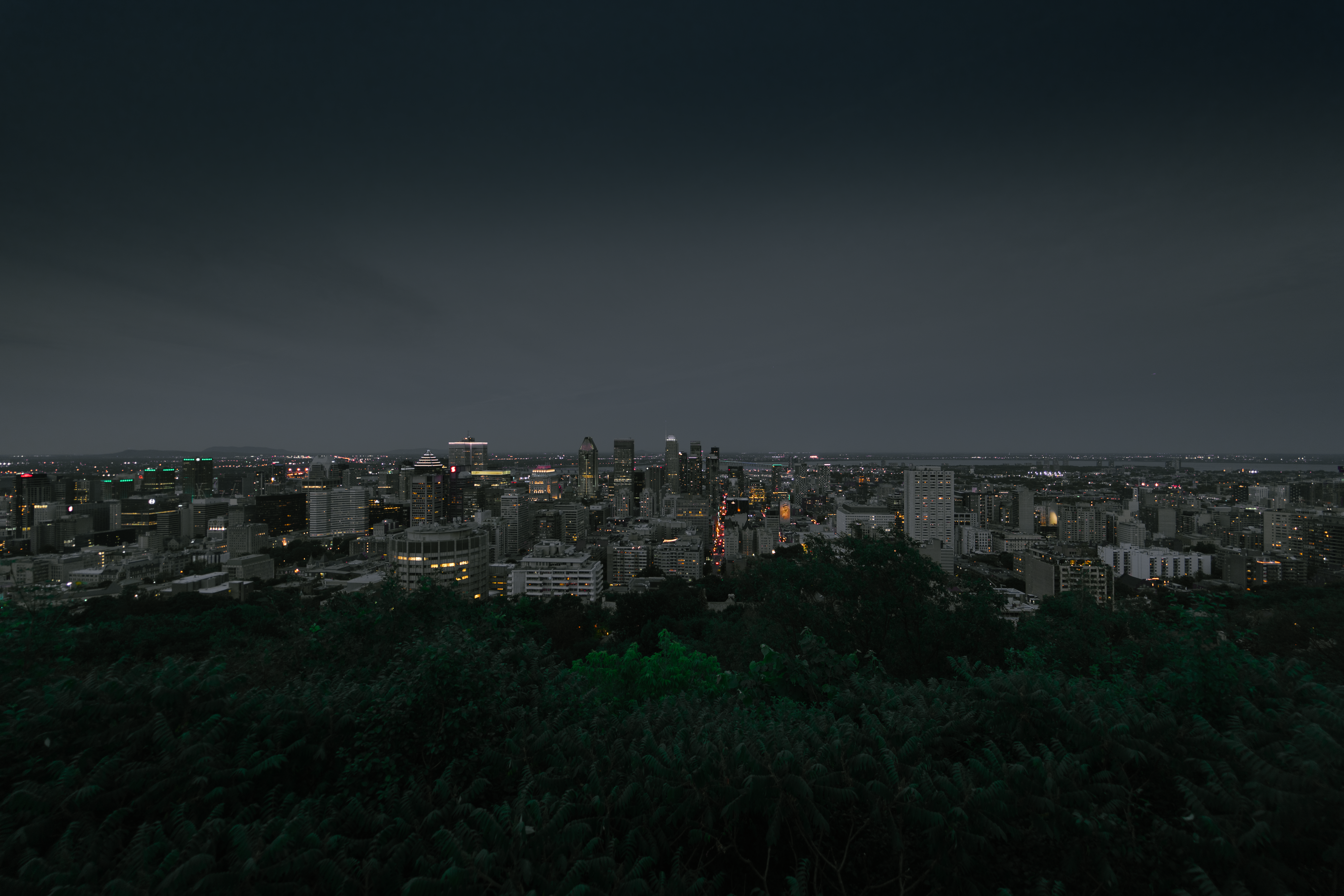 City with high rise buildings during night time photo – Free 蒙特利尔 Image ...