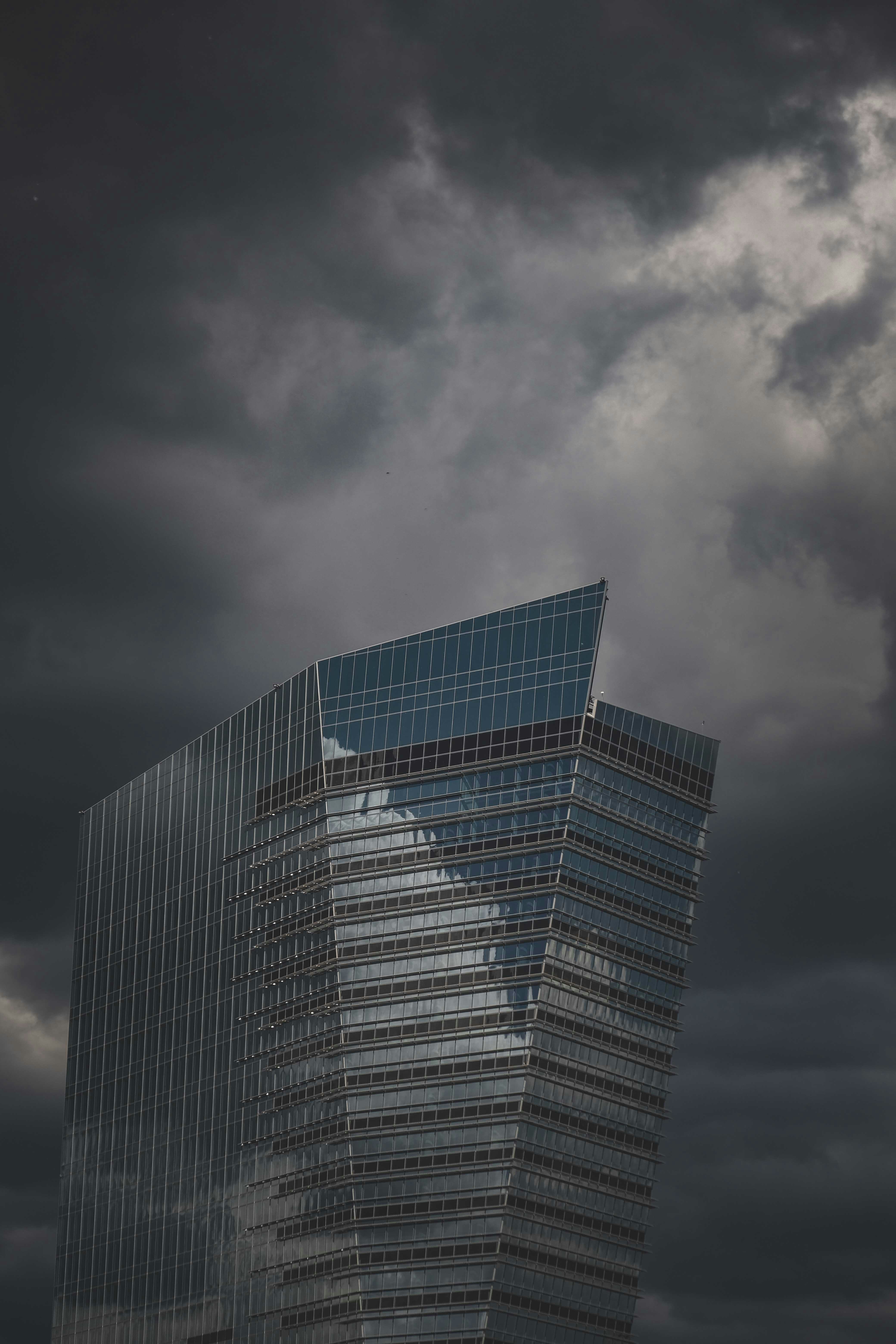 Gray concrete building under gray sky photo – Free Grey Image on Unsplash