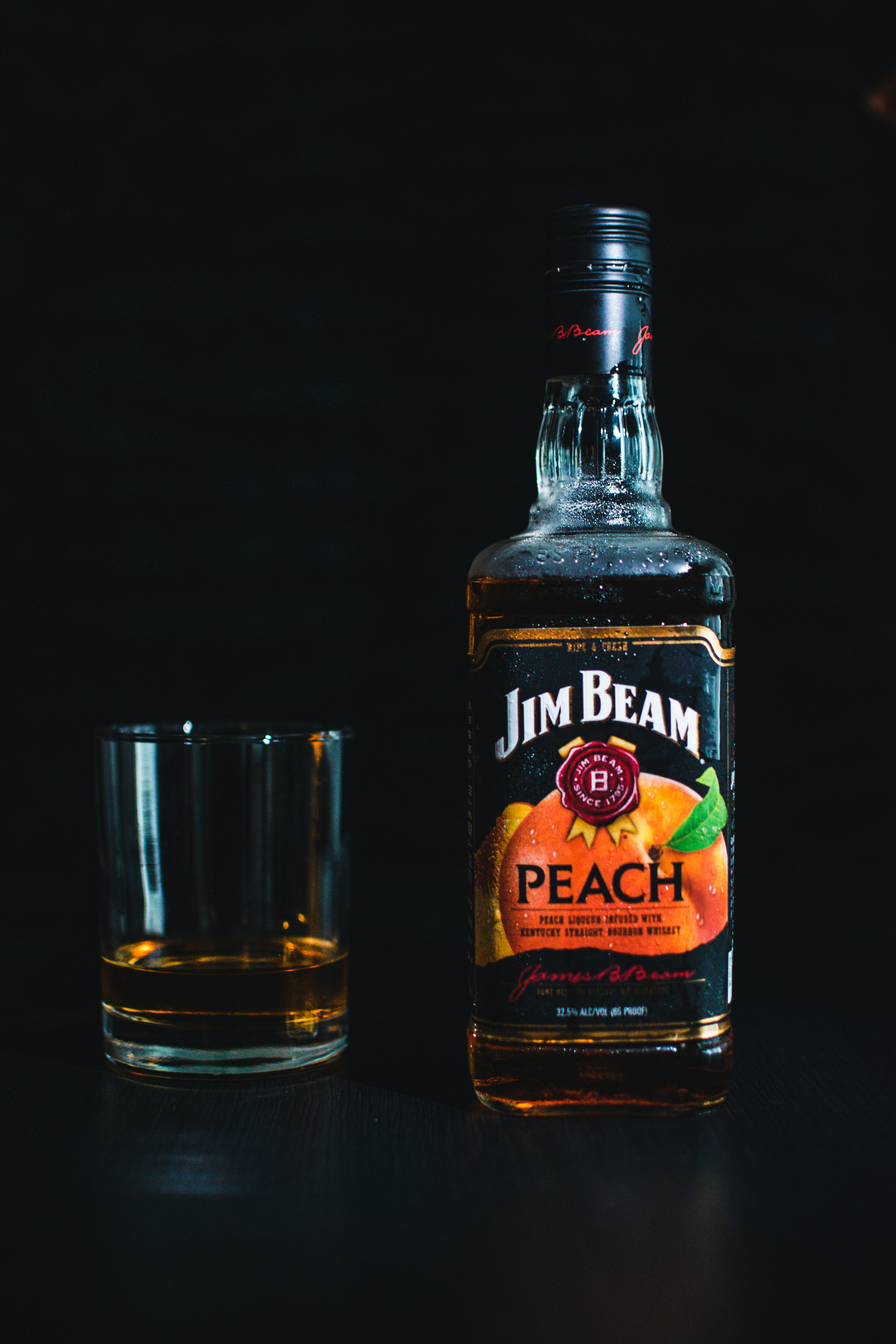 Noir Still Life: Jim Beam Peach in Quiet Light