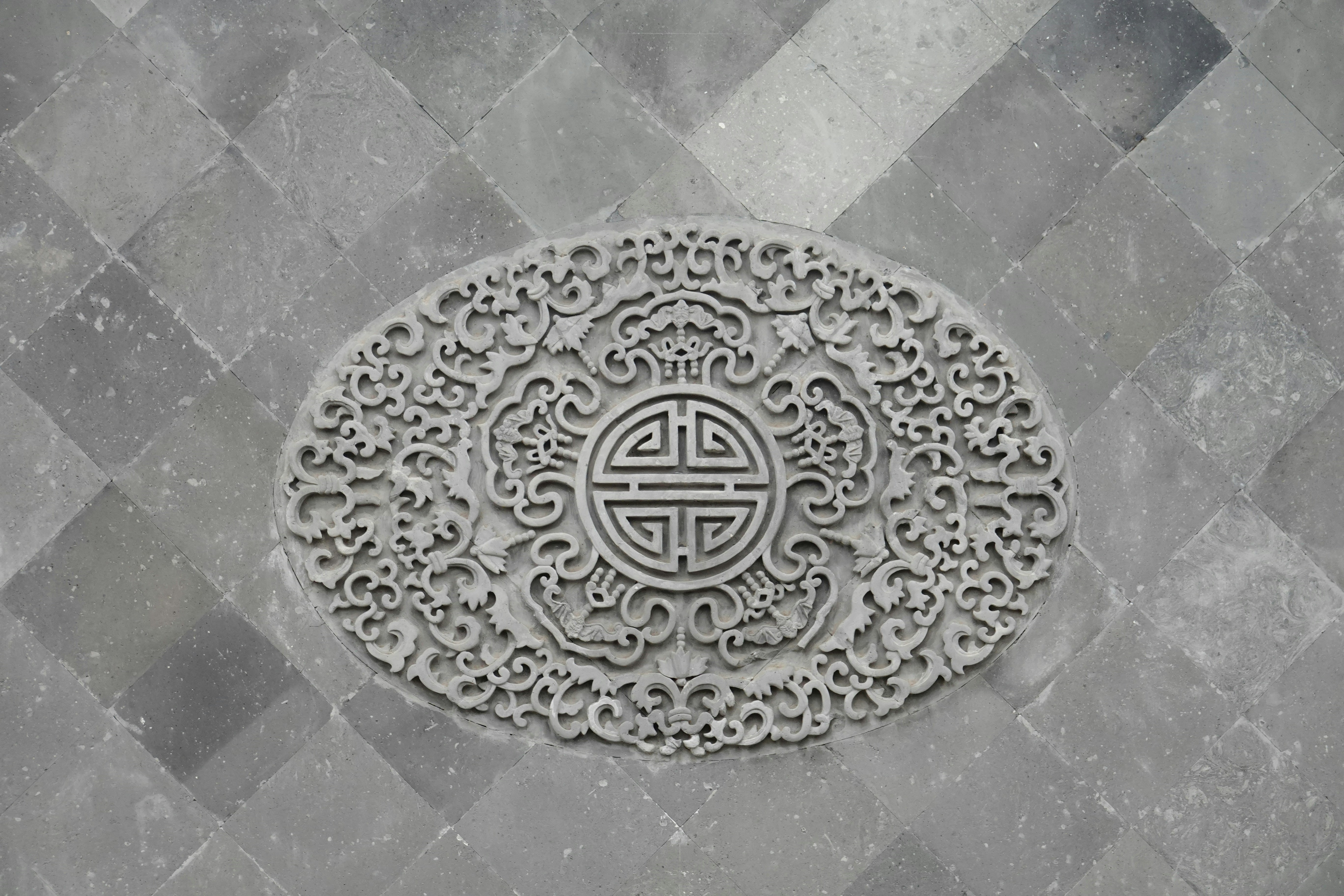 round grey floral embossed round decor