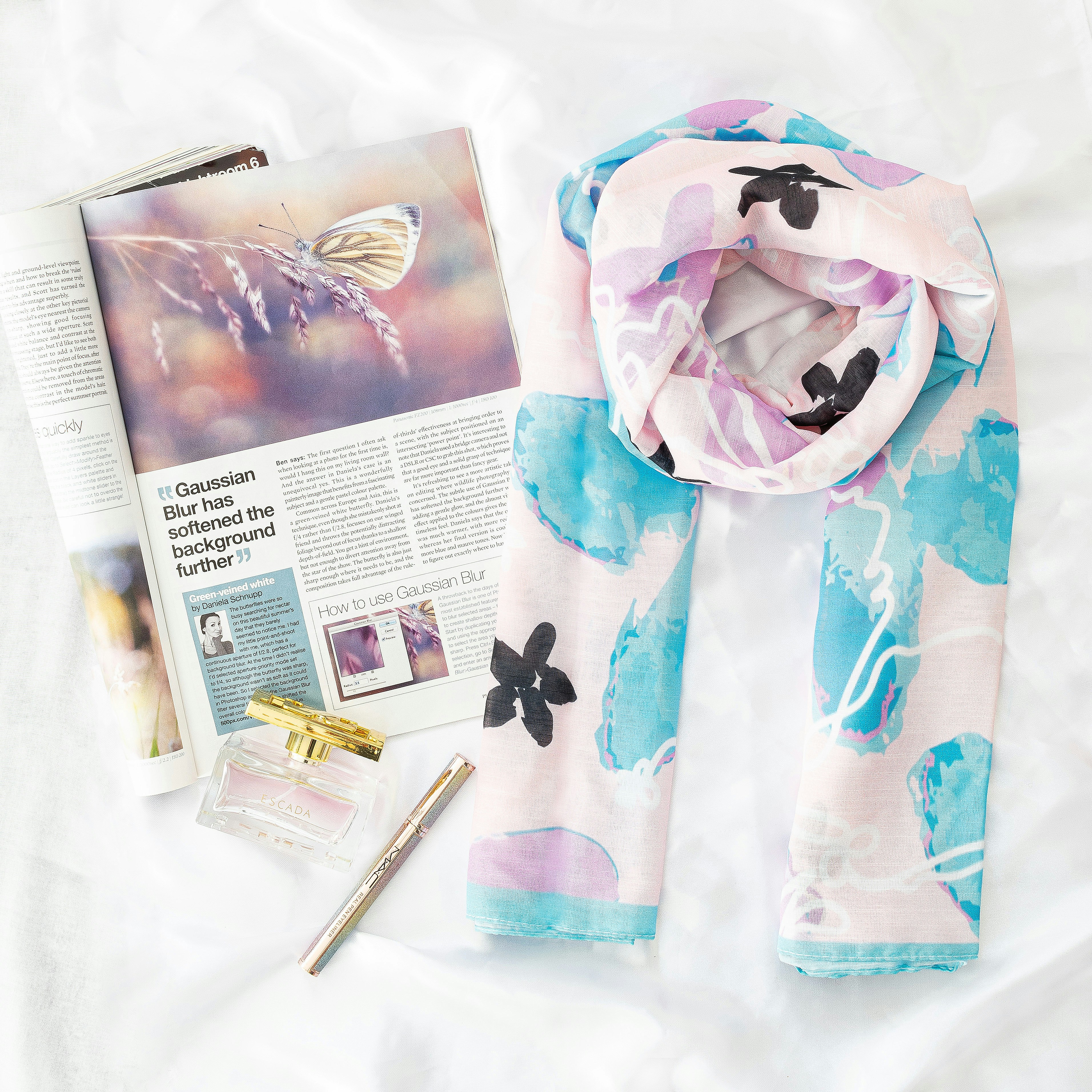 Pastel Fashion Muse: A Scarf and Magazine Still Life