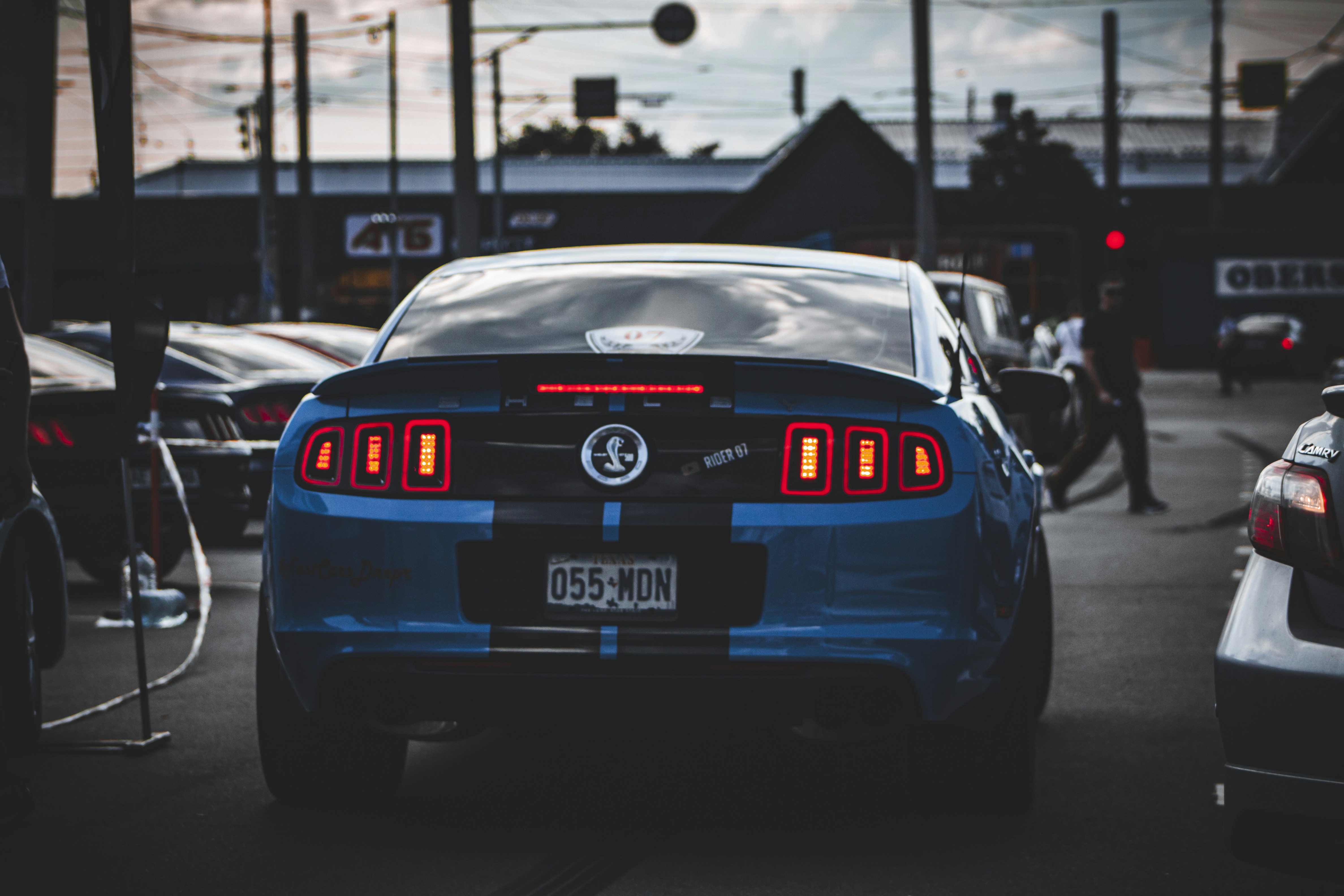 blue bmw m 3 on road during daytime