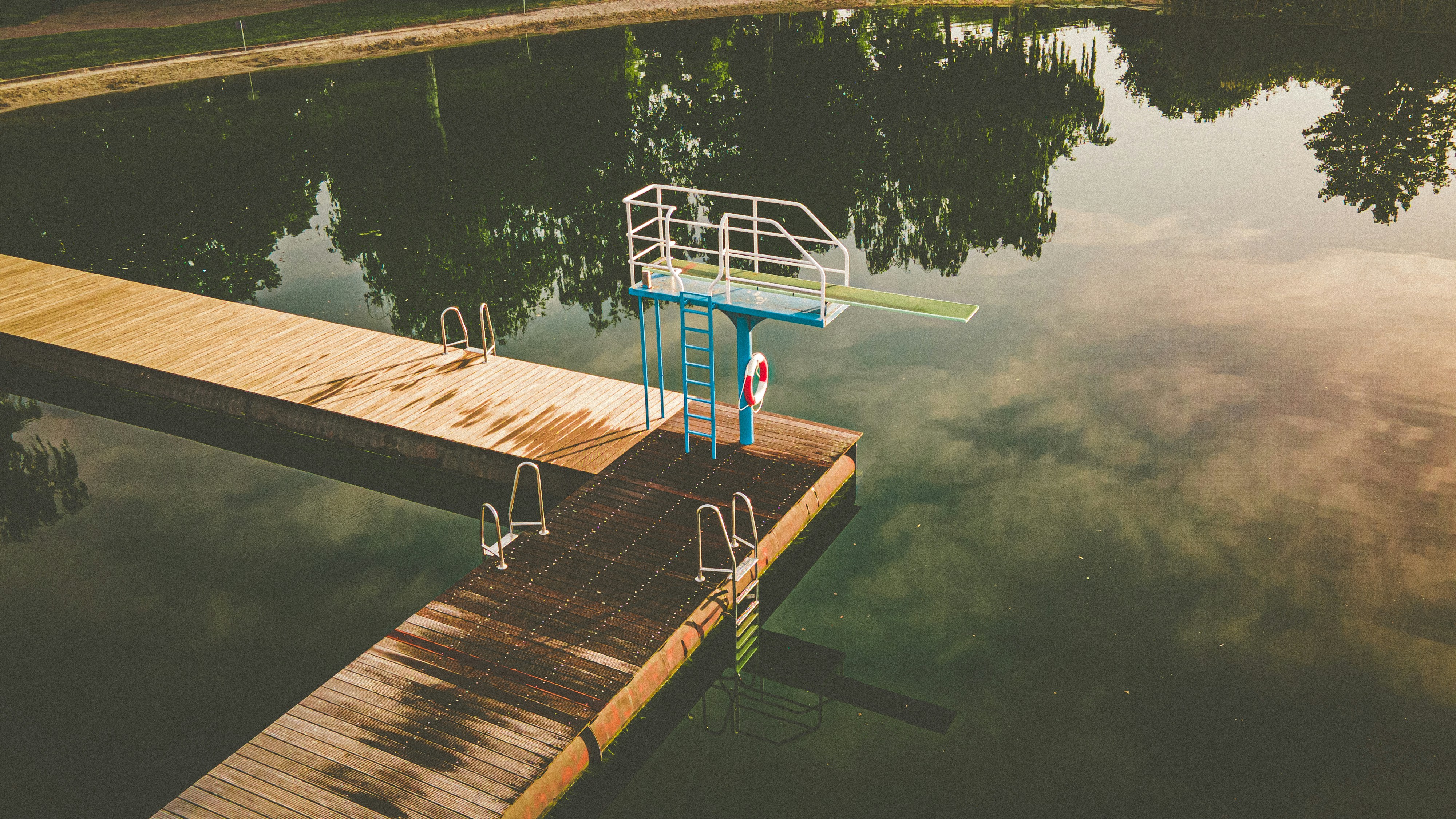 Floating Docks at Dusk: A Mirror on Still Water