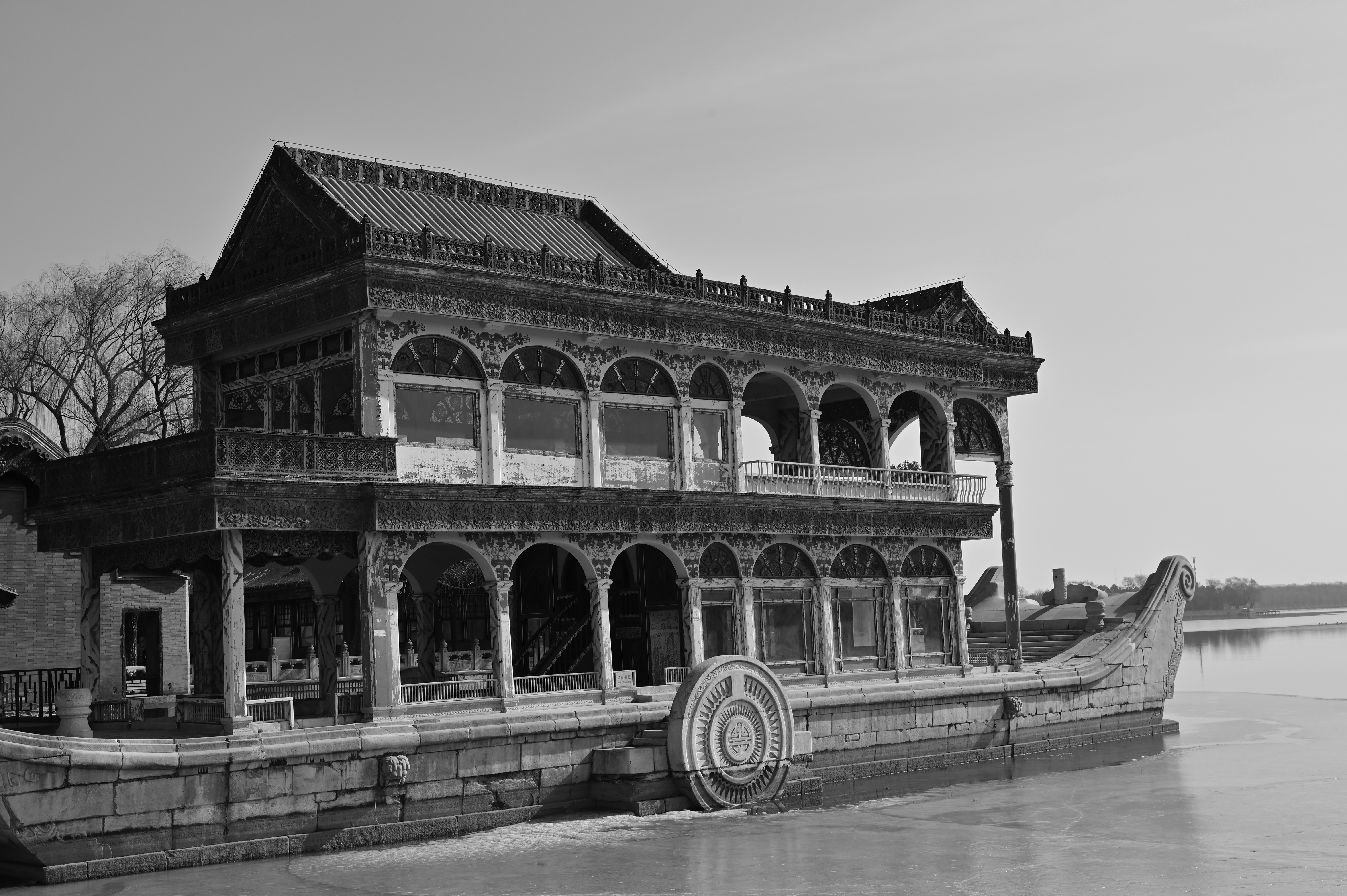 Arched Riverside Pavilion on a Barge: Quiet Gray Grandeur