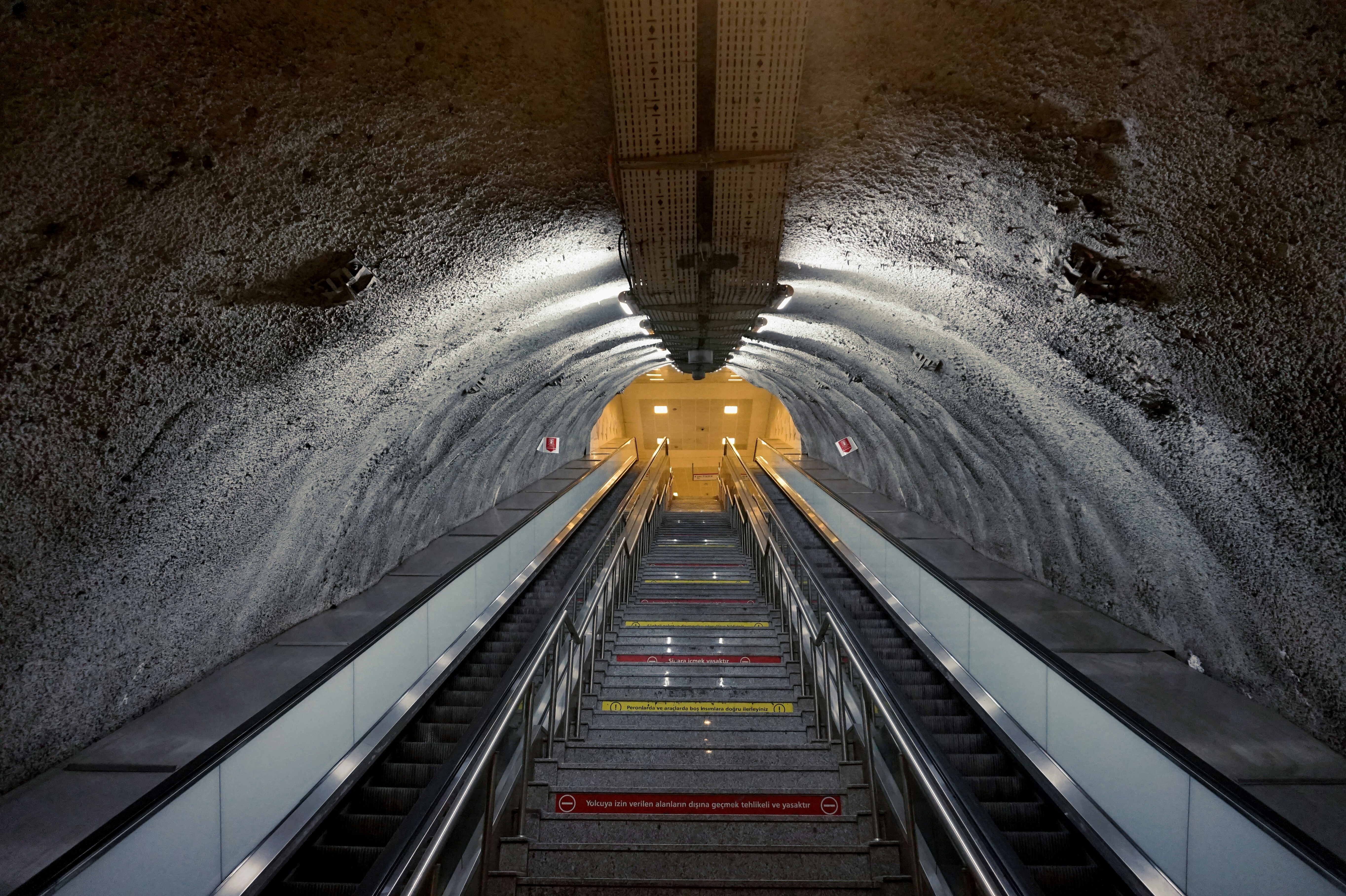 Underground Ascent: Escalator Through the Tunnel
