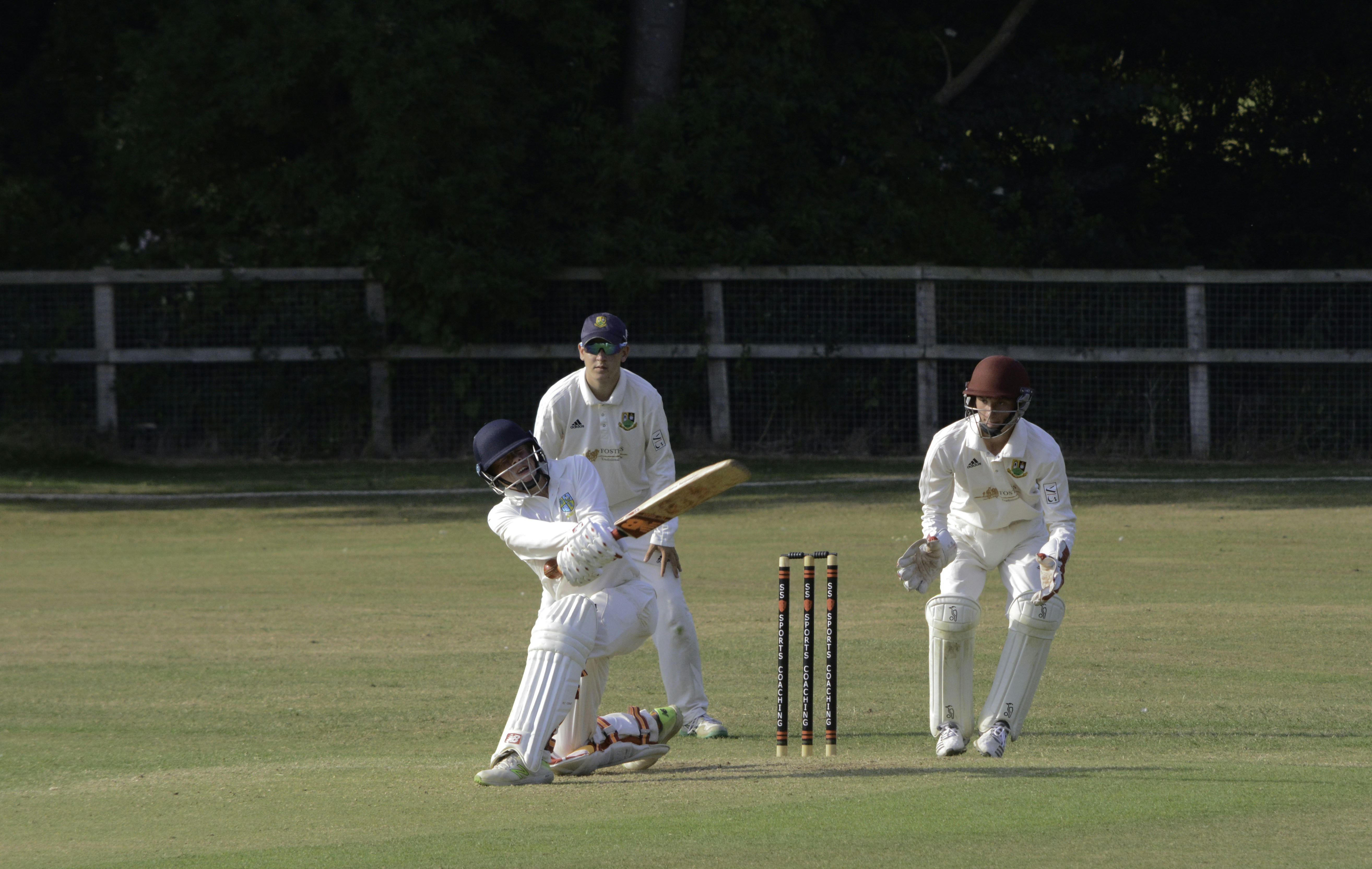 Spot the ball | 2 men playing cricket on green grass field during daytime