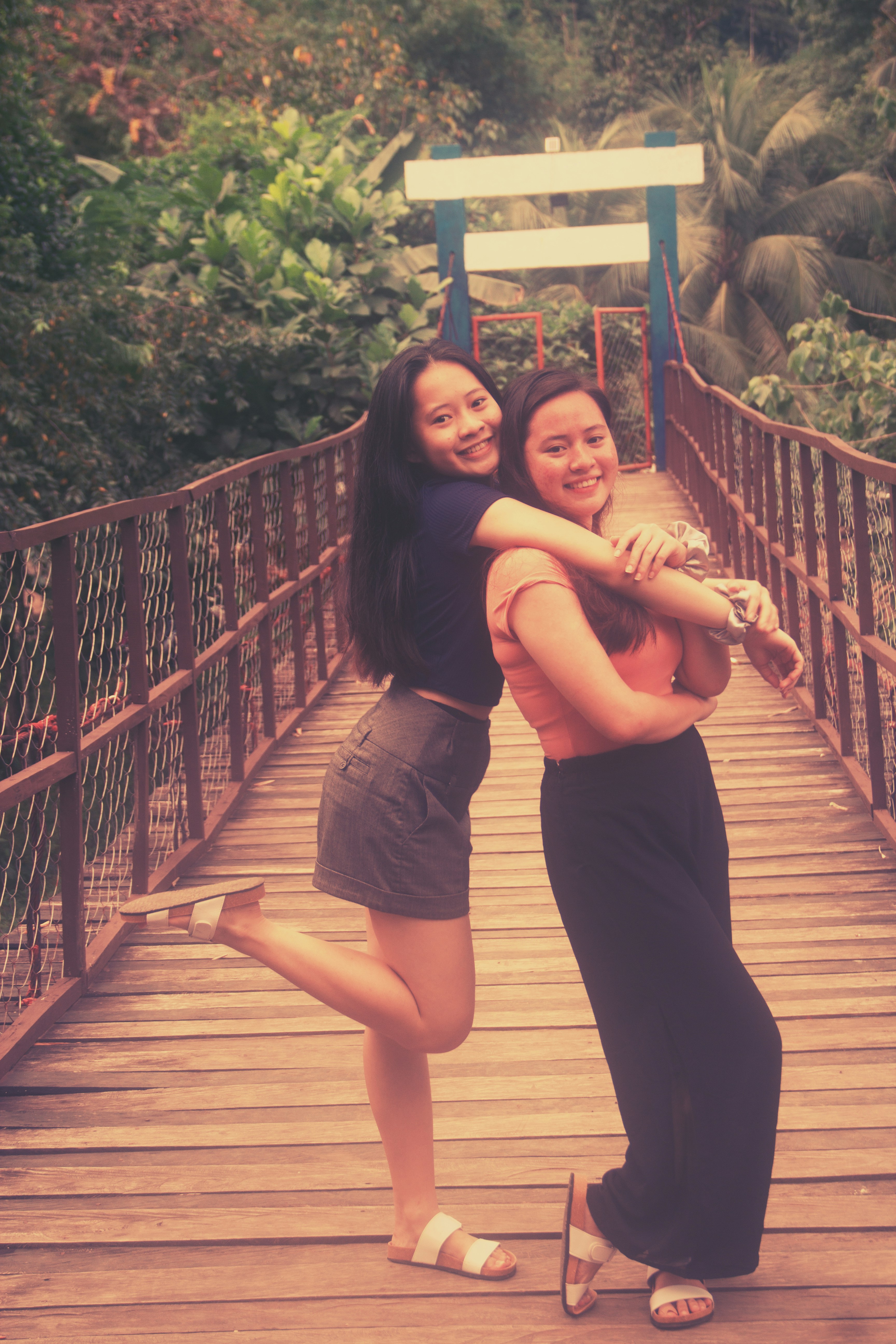 Woman in black tank top hugging woman in black dress photo – Free ...