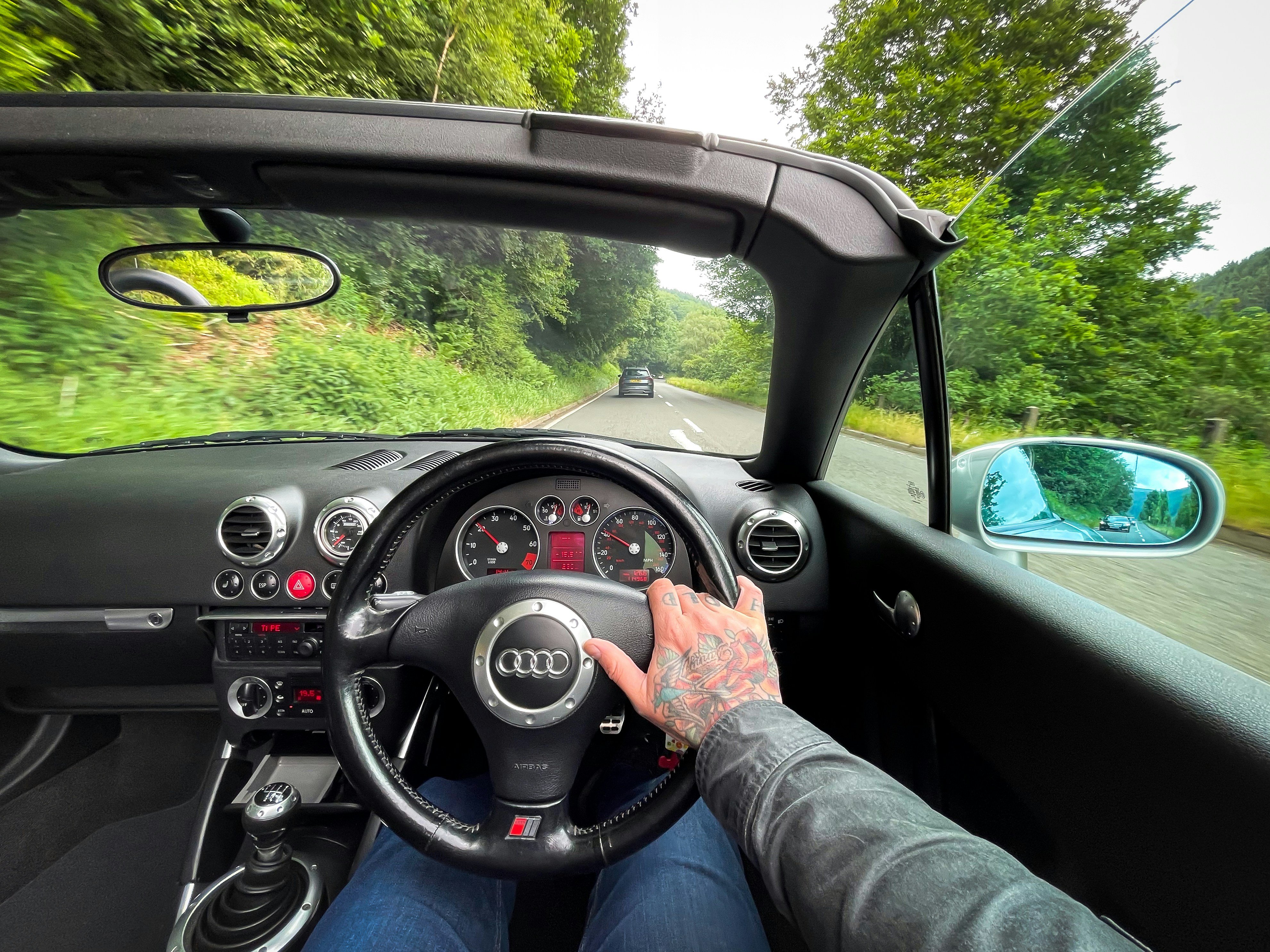 Palm-Stamped Drive: A First-Person Spin Through the Convertible