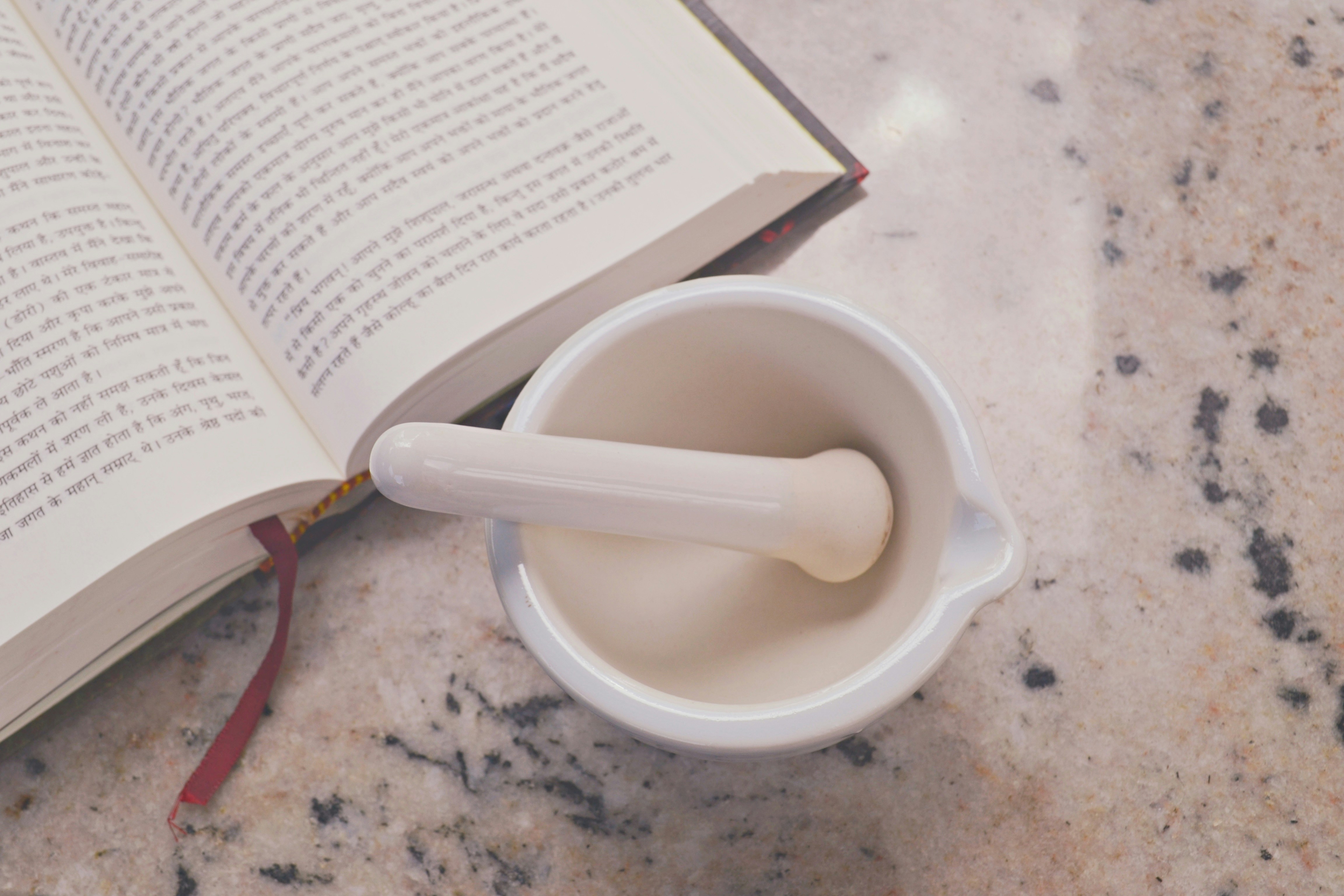 Mortar and Manuscripts: A Quiet Still-Life on Marble