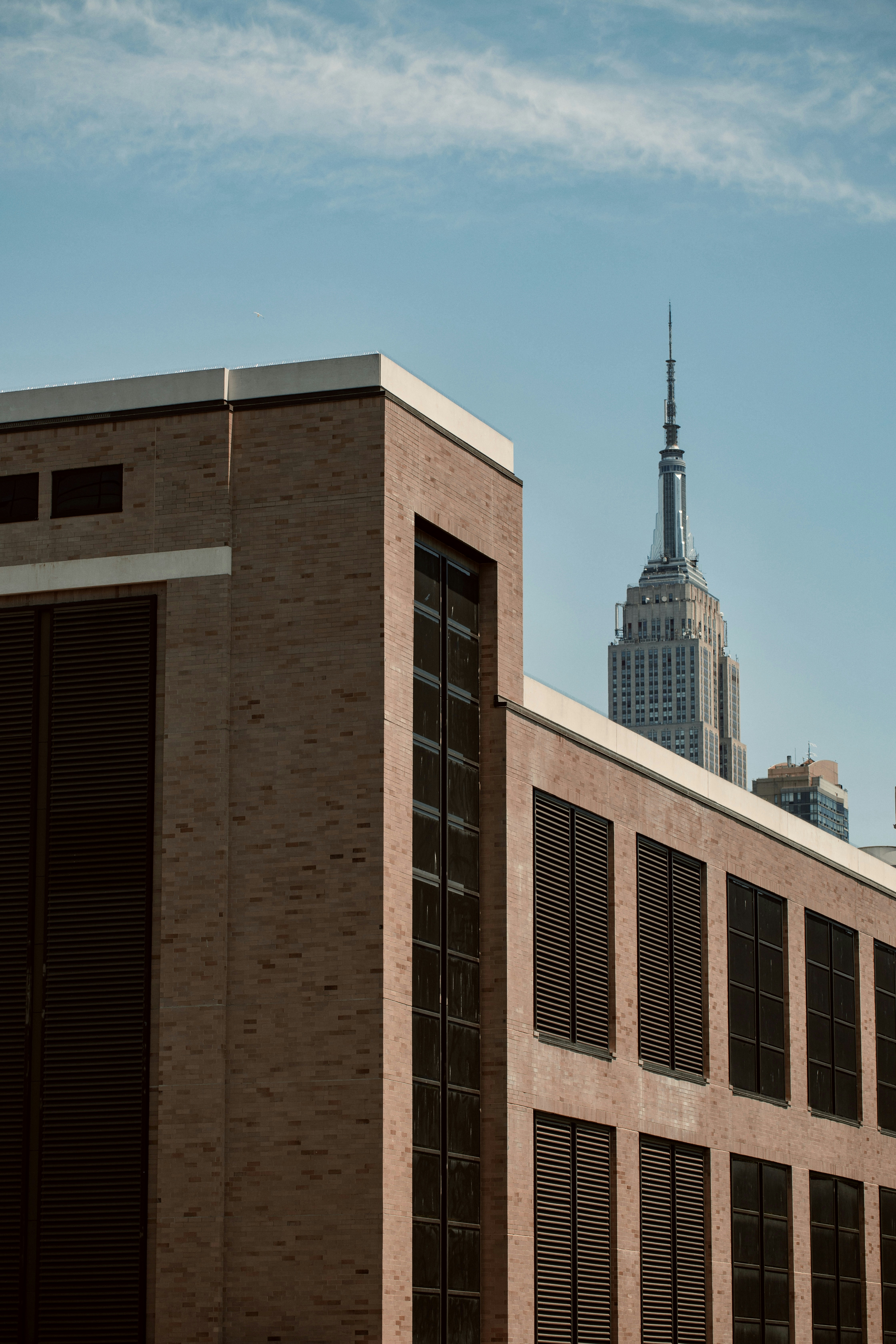 Brown concrete building under blue sky during daytime photo – Free ...