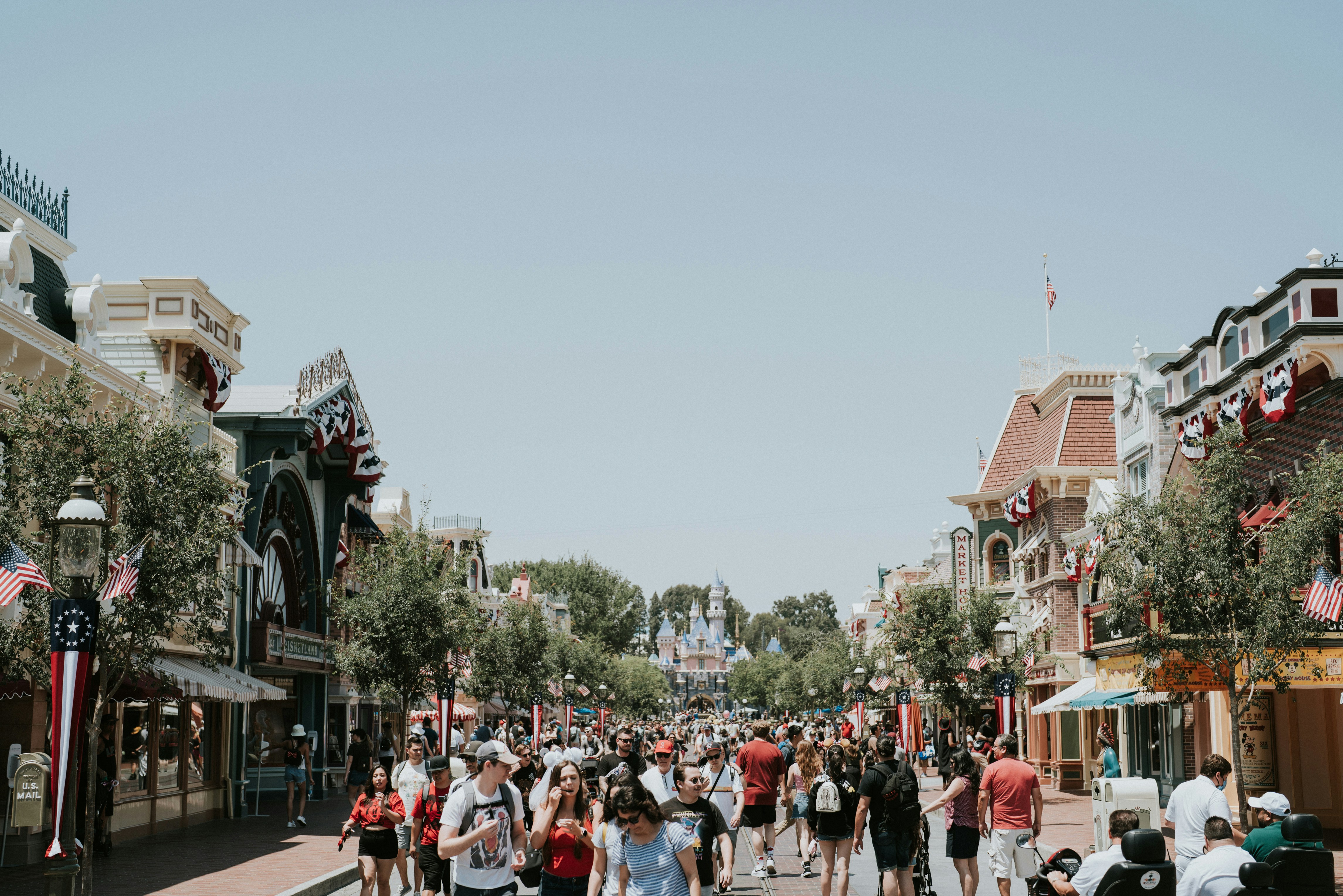 People walking on street near building during daytime photo – Free ...