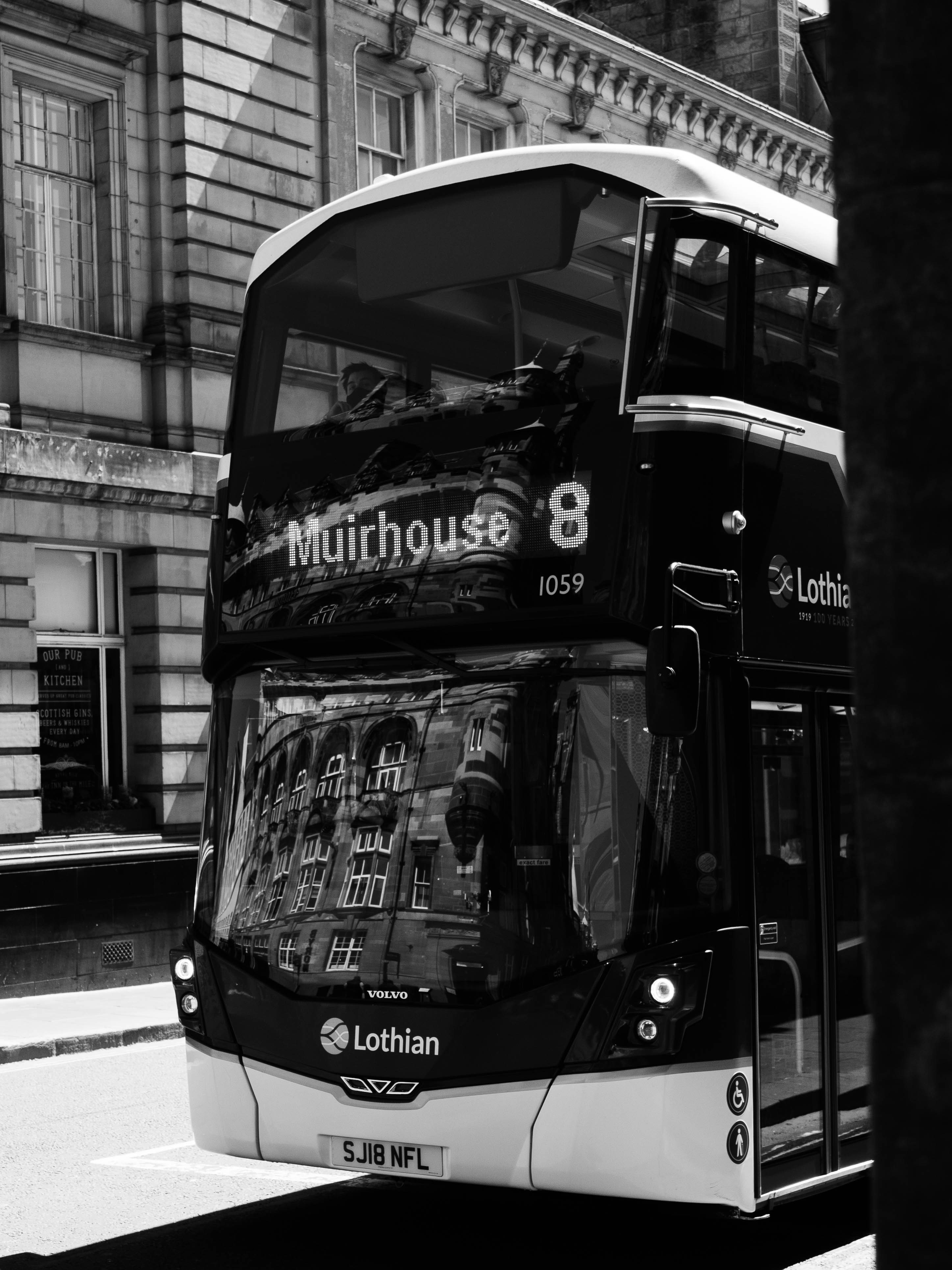 grayscale photo of double decker bus