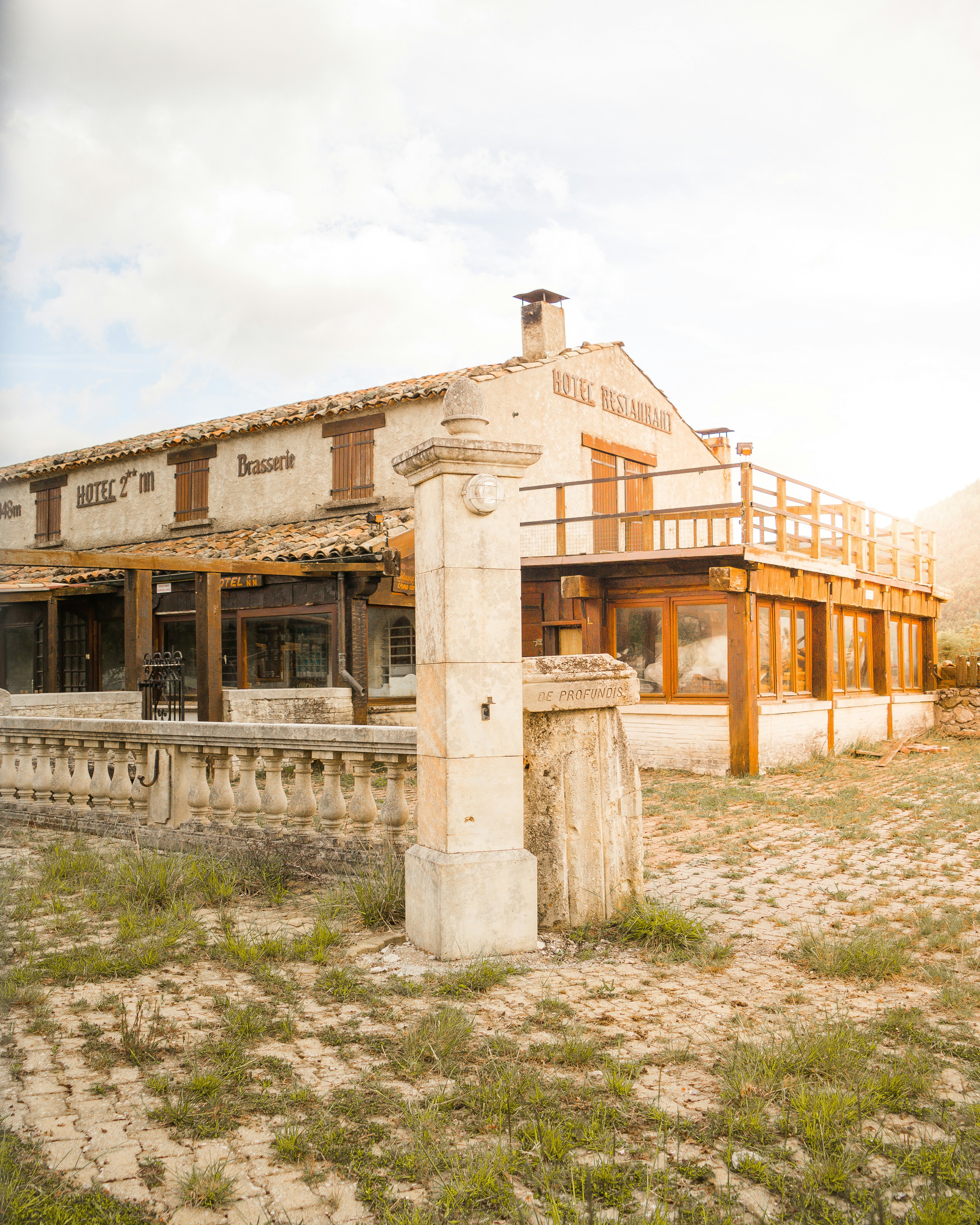 Sunlit Ruins of a Deserted Hotel at Dusk