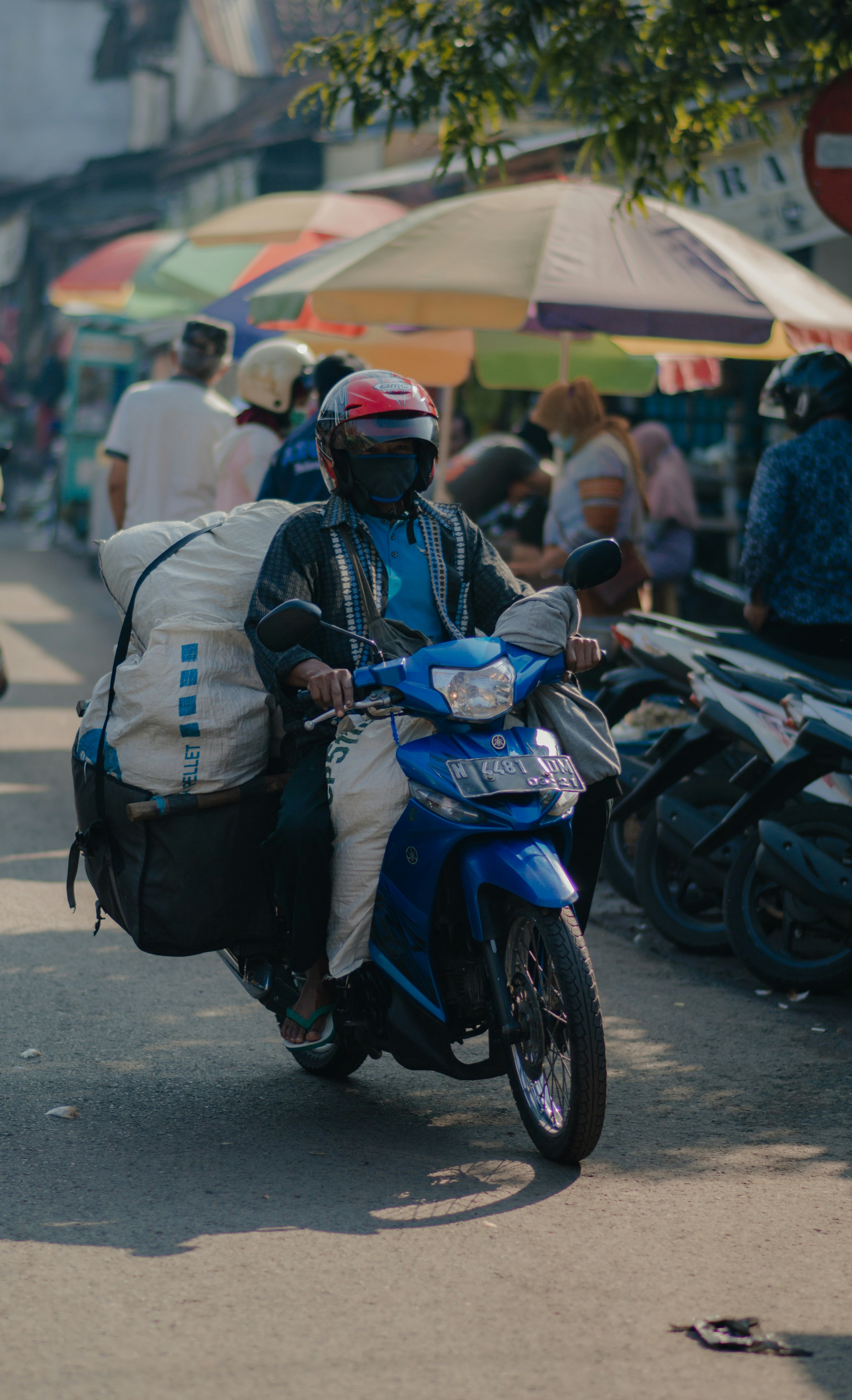 Man in blue jacket riding blue motorcycle during daytime photo – Free ...
