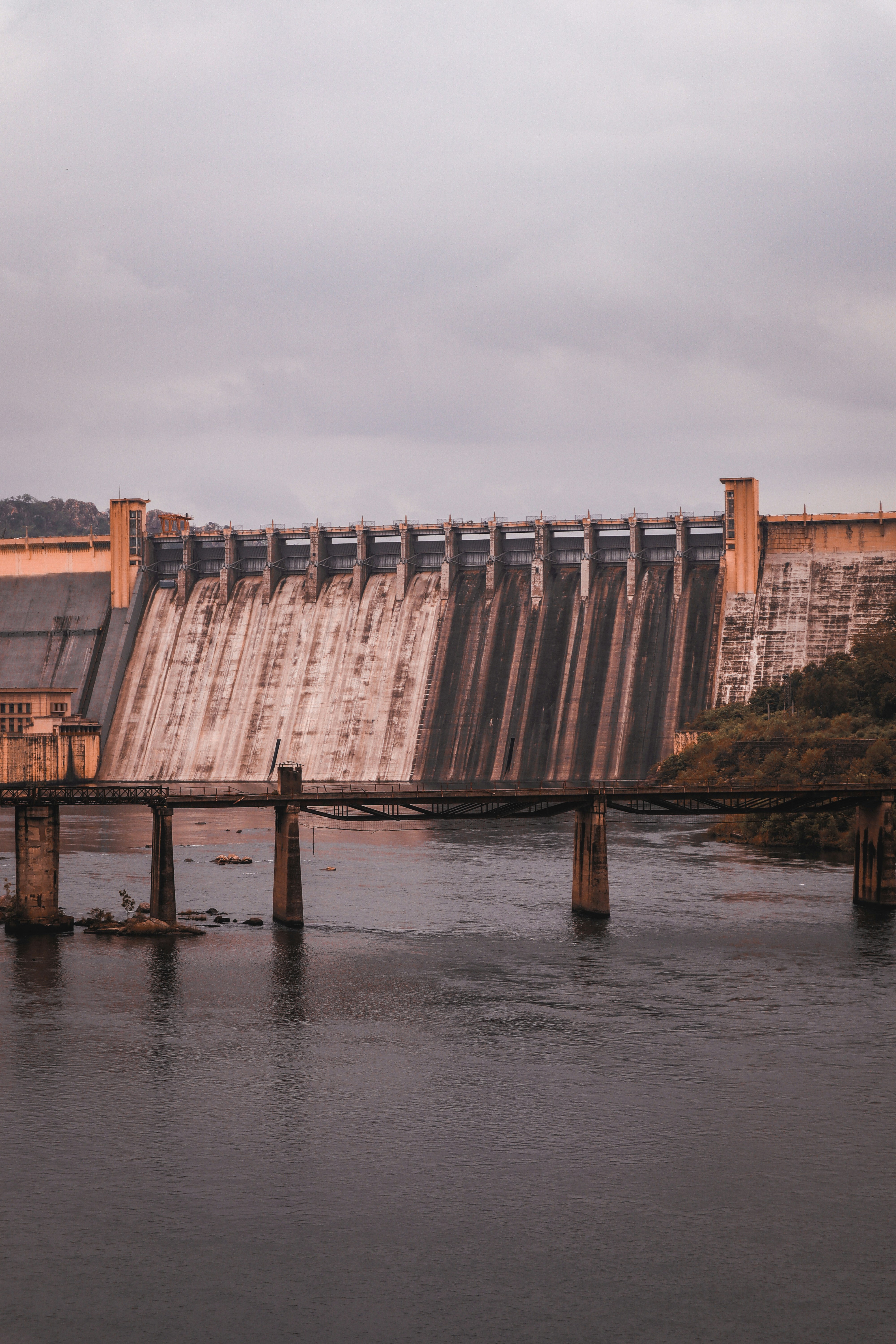 Gray concrete dam under gray sky during daytime photo – Free Rihand ...