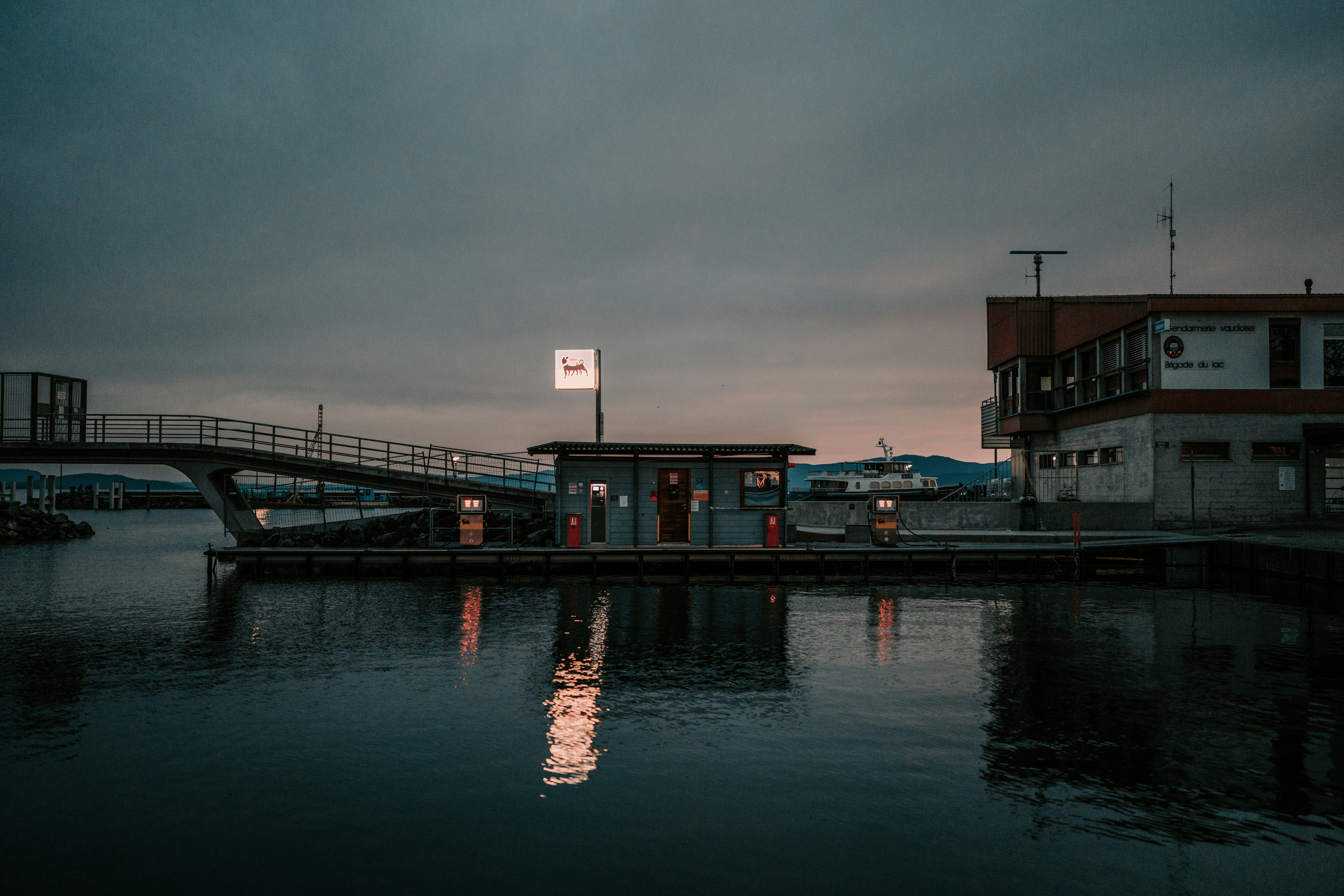 Black and white building on dock during daytime photo – Free Lausanne Image on Unsplash