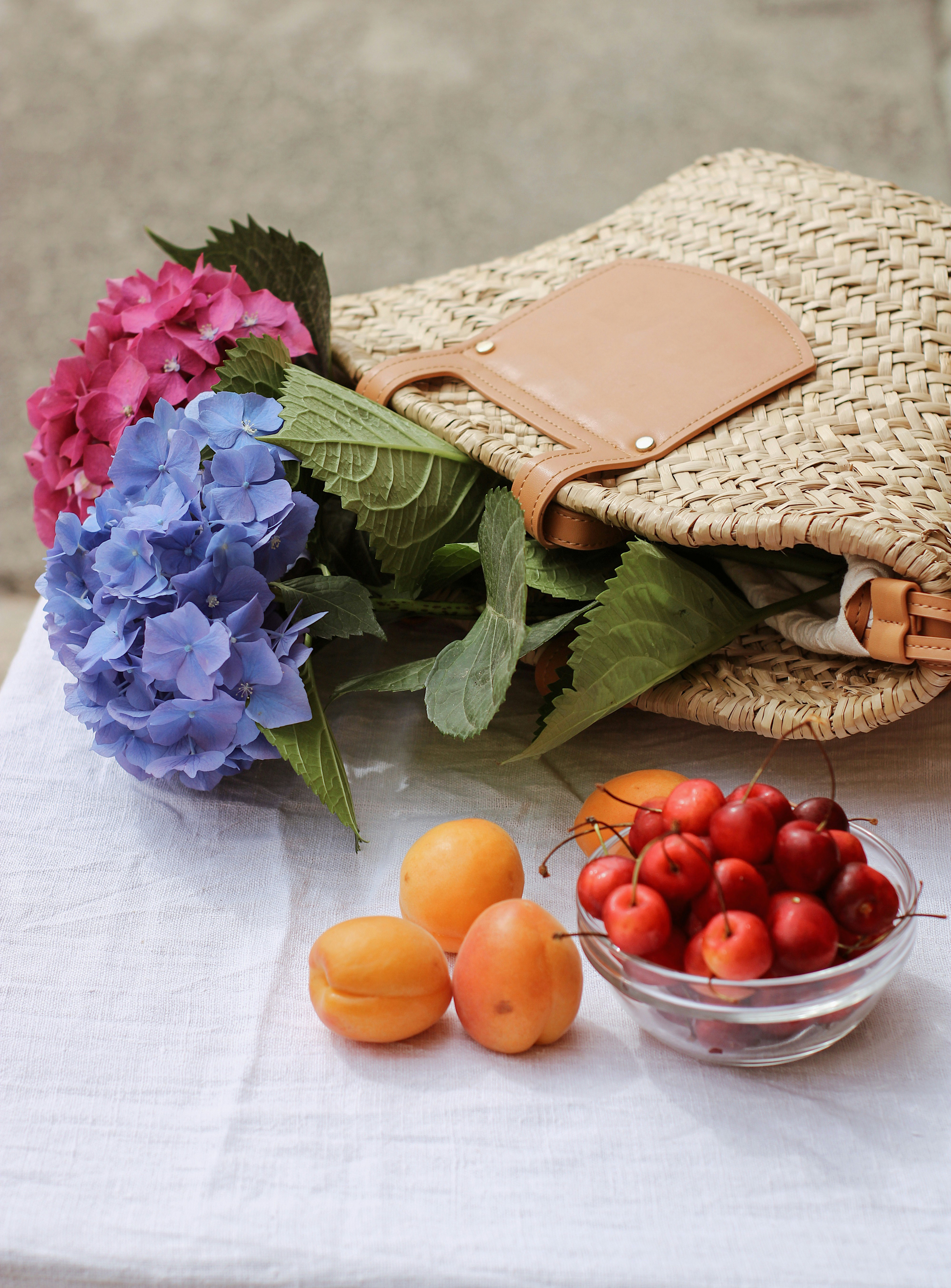 Pastel Hydrangeas by the Straw Tote: A Quiet Still Life