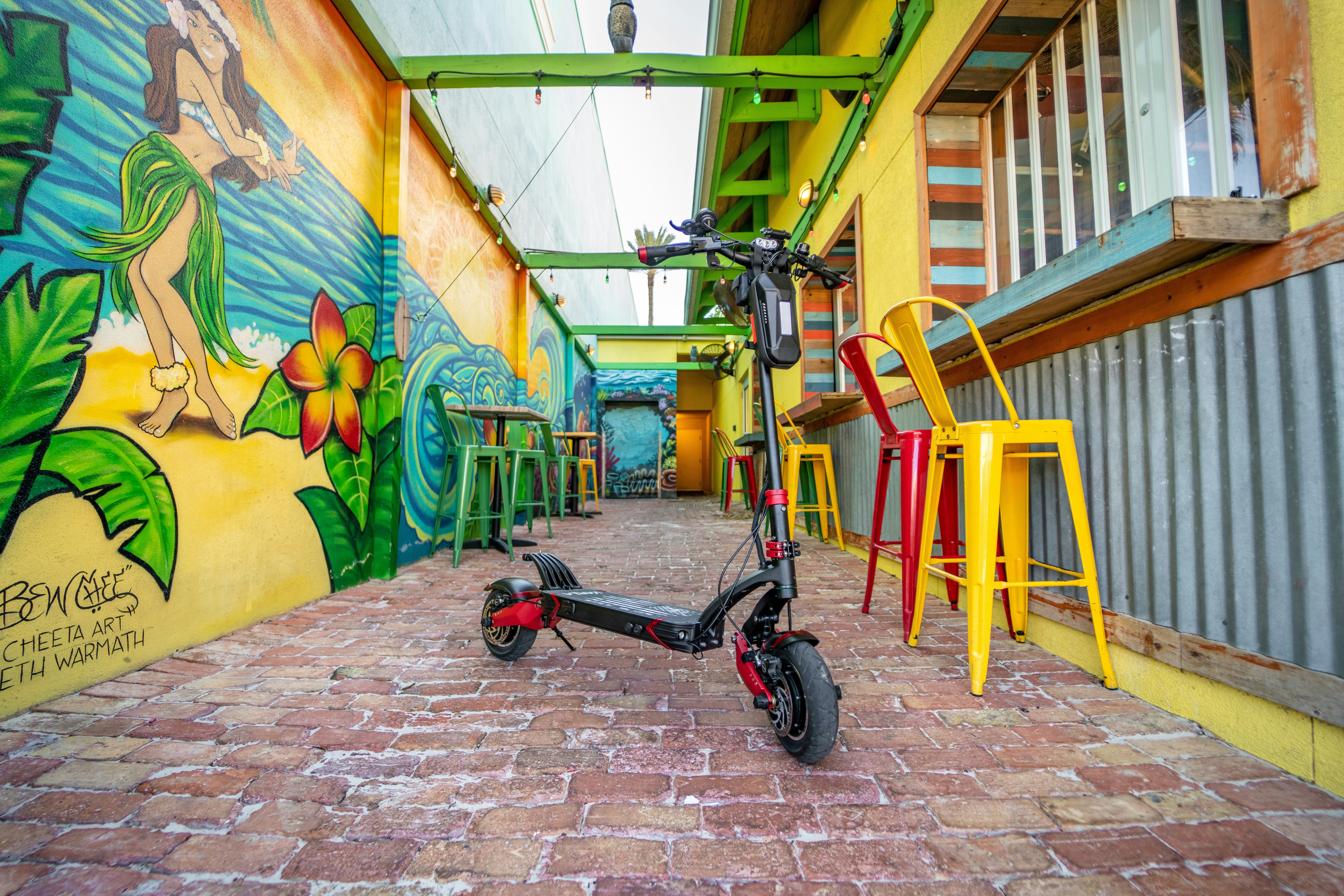 Electric Ride amidst a Colorful Alley Mosaic