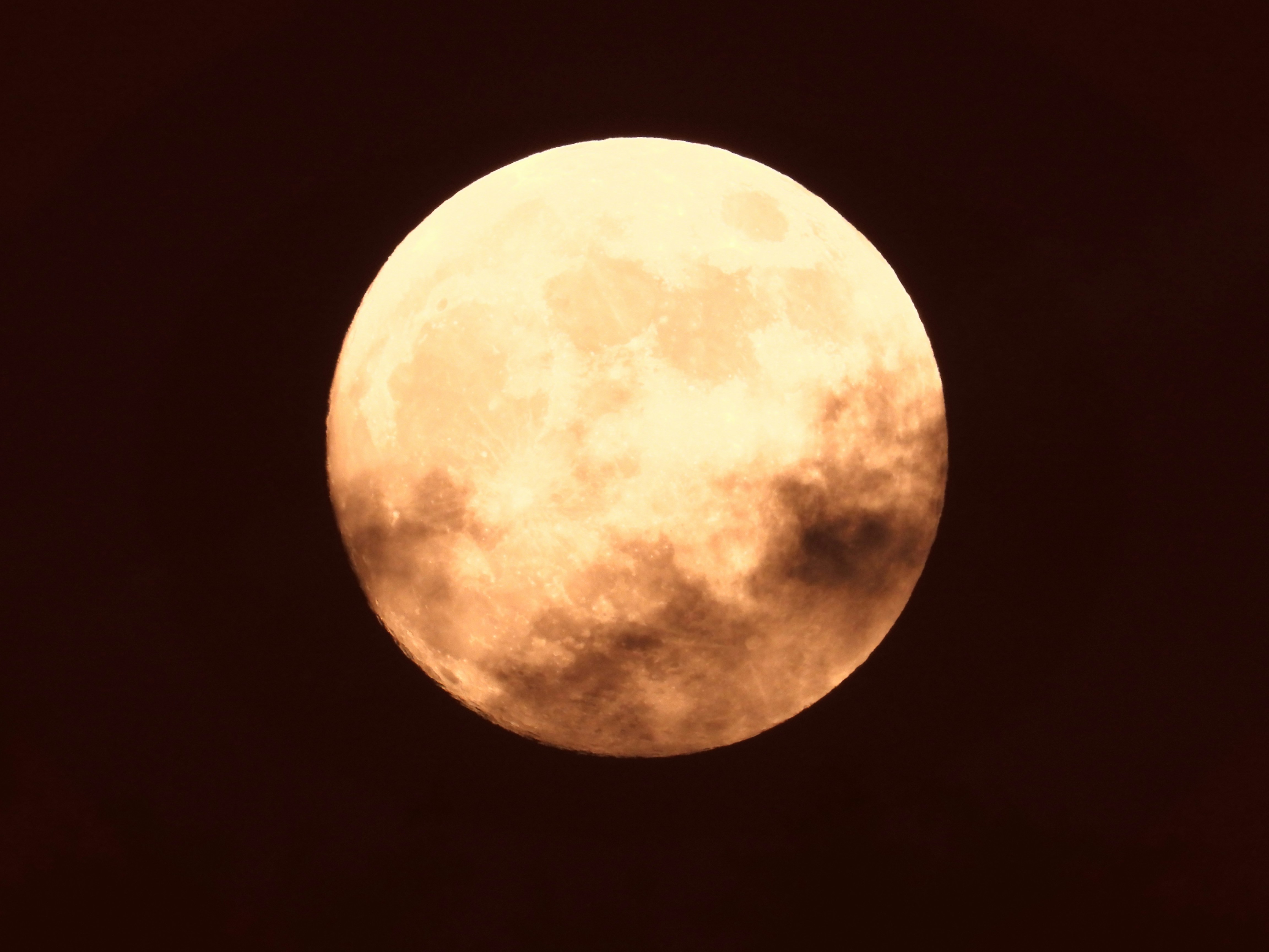Copper Moon over a Quiet Night: Ember-Hued Lunar Glow