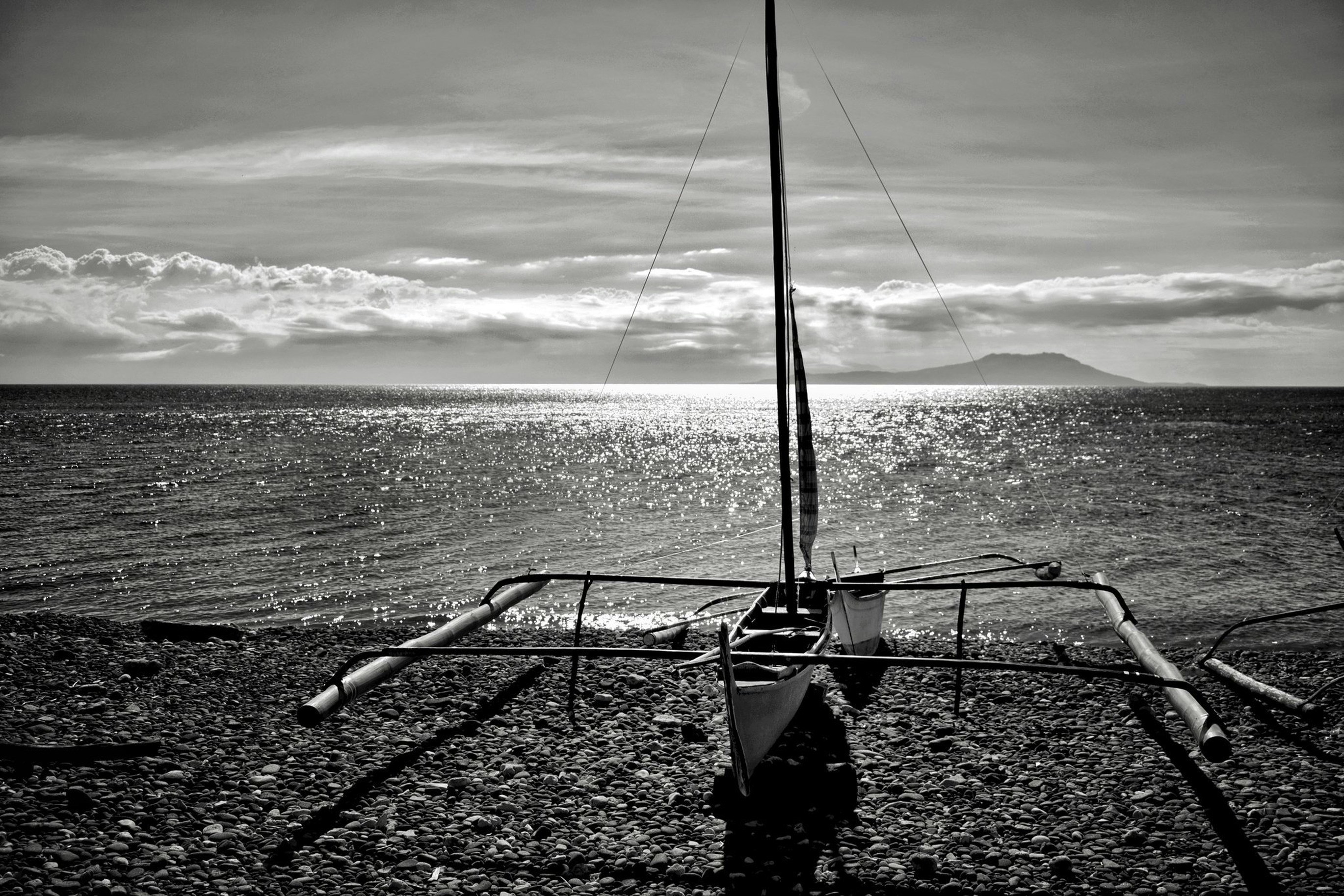 Black and white fishing net on gray sand during daytime photo – Free ...