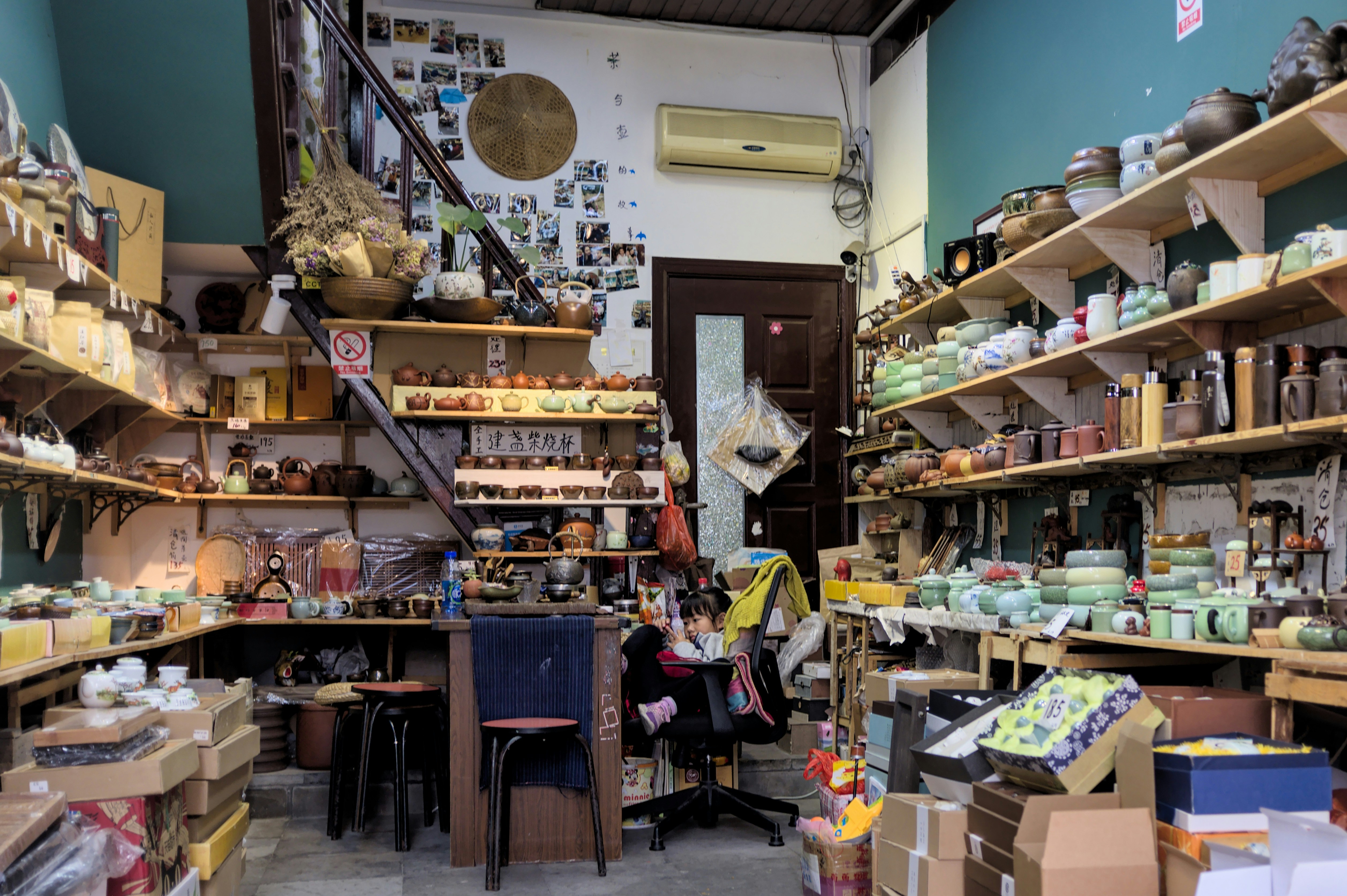 Shelves of Clay: A Busy Ceramic Studio Brimming with Color