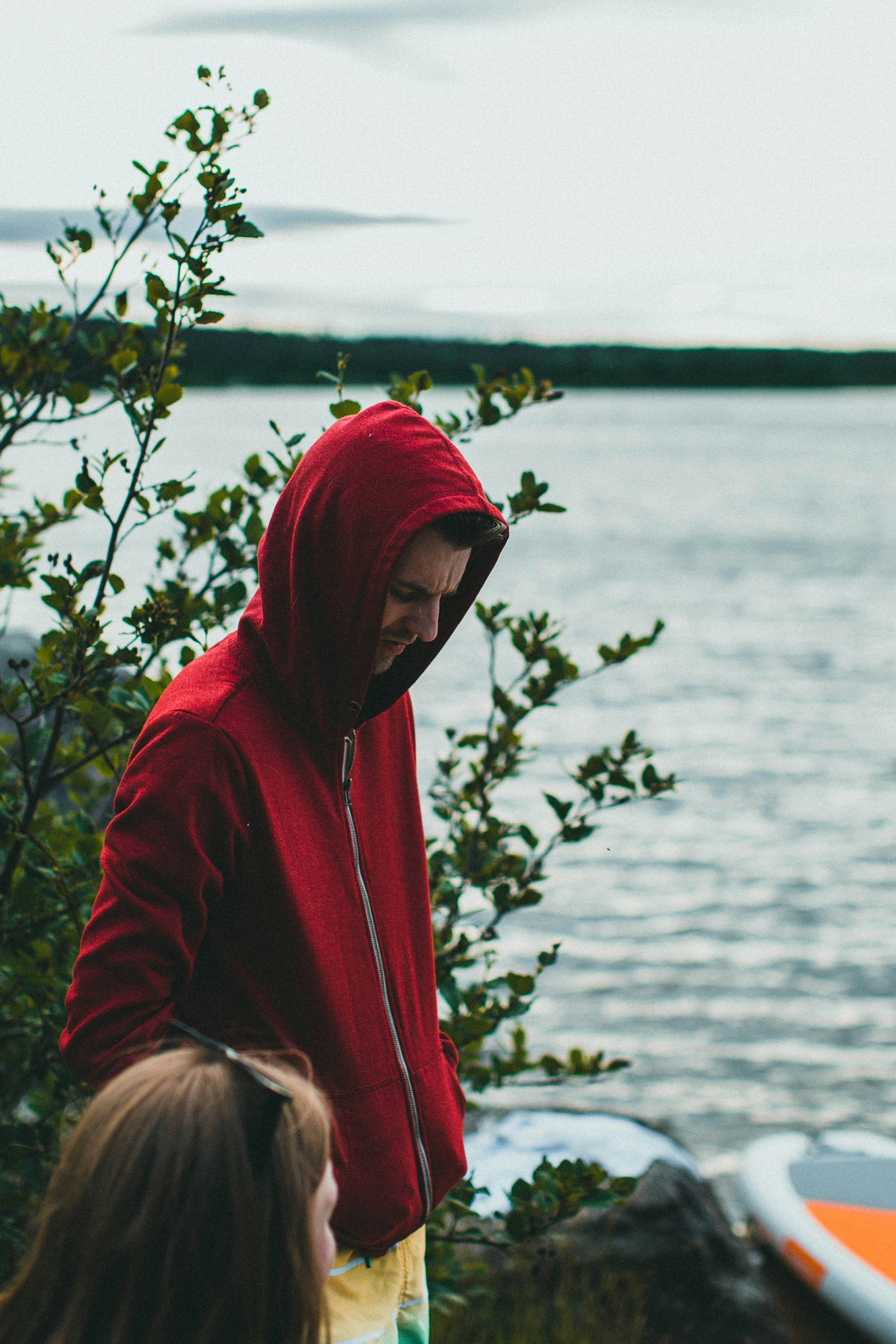 Red-Hooded Moment Along the Lakefront