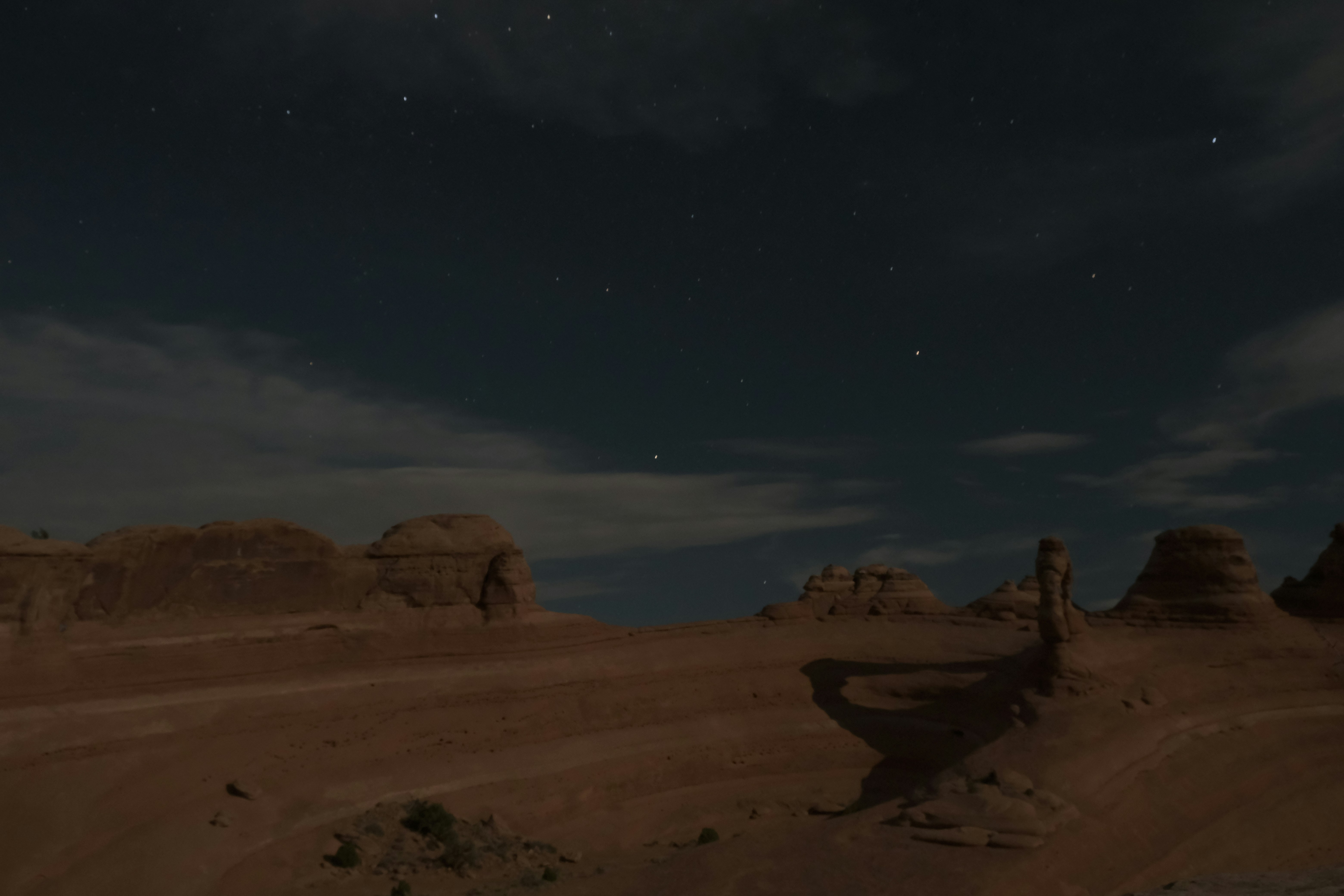 Moonlit Canyon Towers Under a Silent Starfield