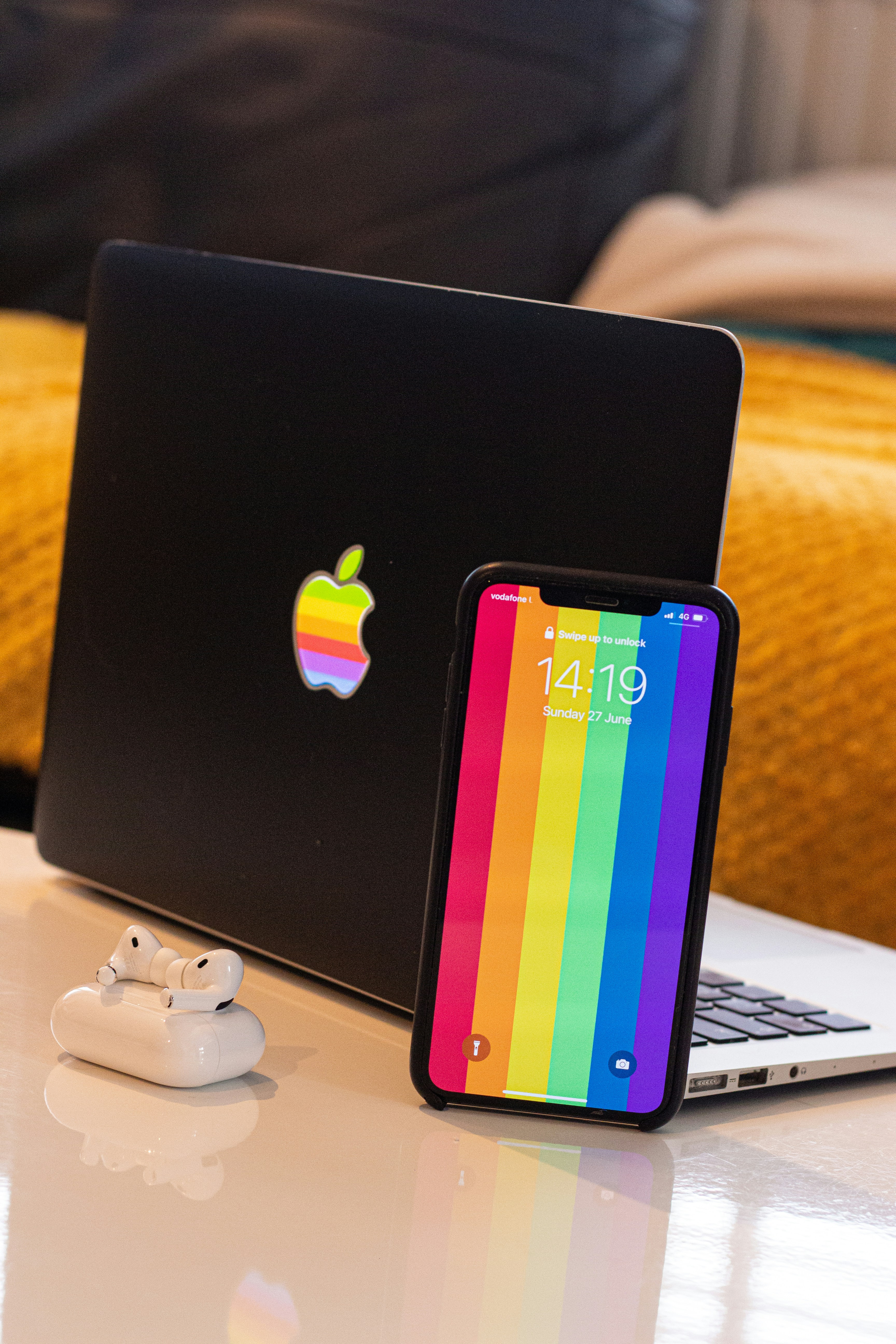 Rainbow Screen Anchor: A Minimal Desk Setup with iPhone and MacBook