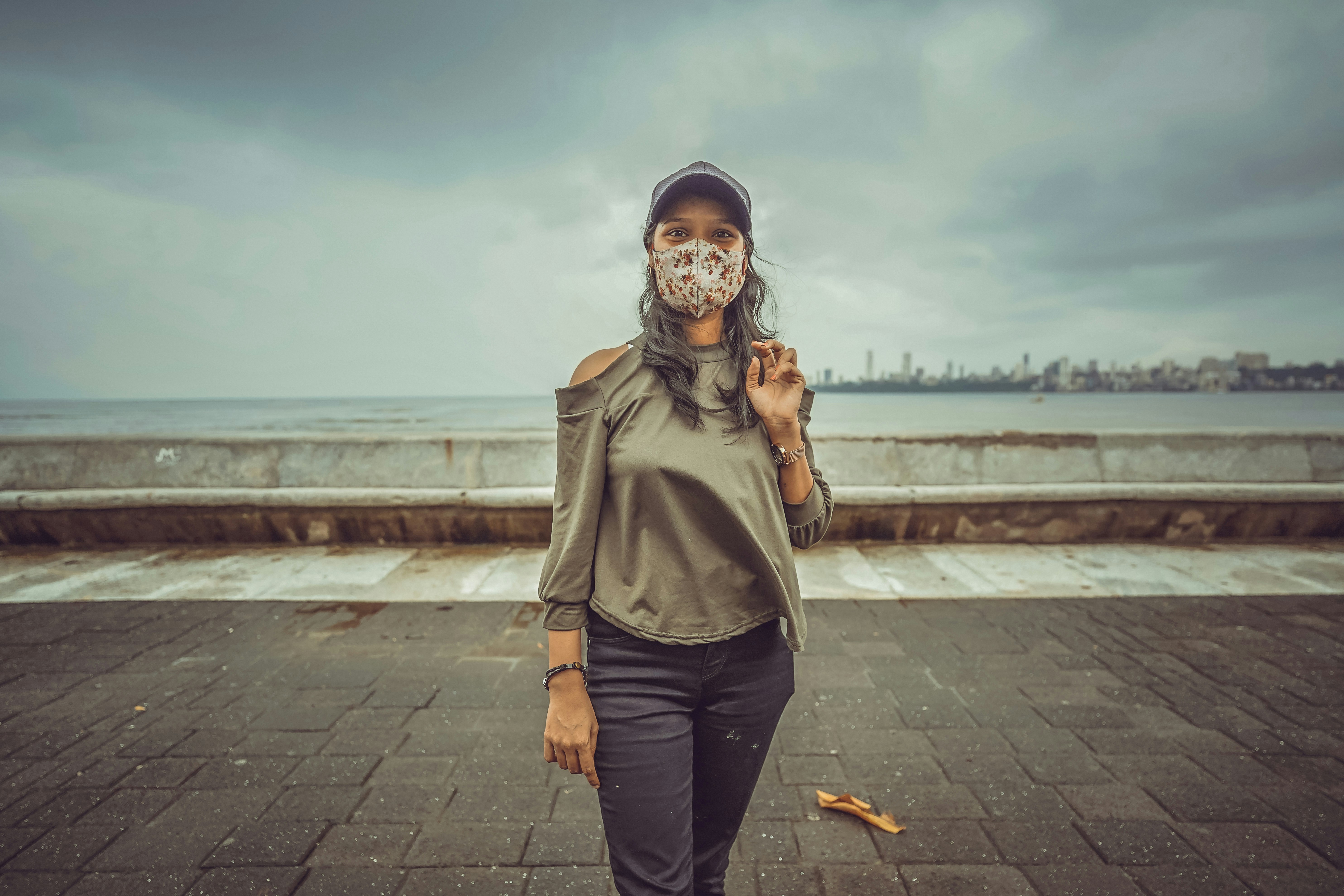 Masked on the Promenade: Salt Air and Quiet Confidence by the Sea