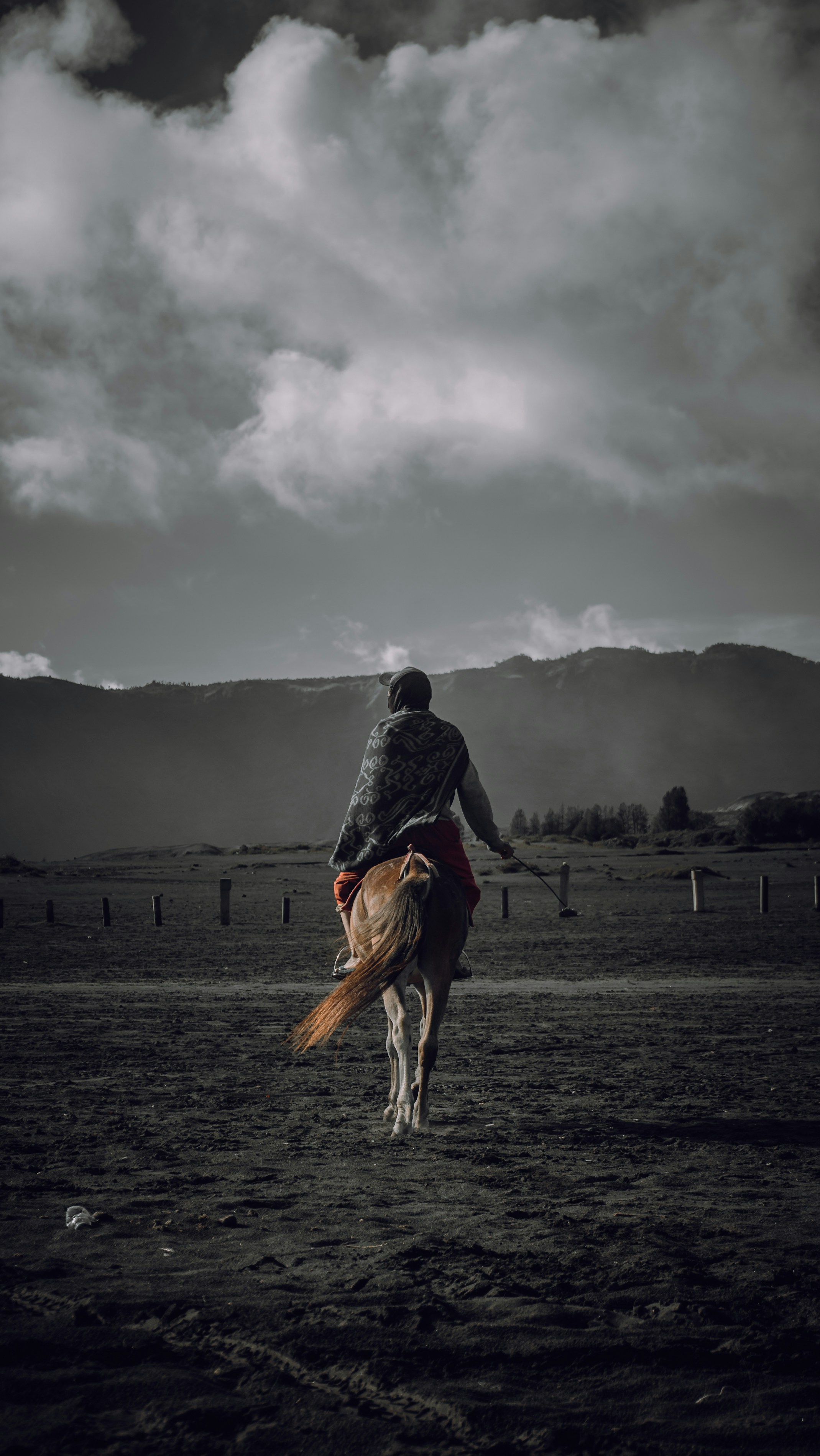 Horizonbound: A Lone Rider Quietly Reaches Toward the Distant Hills