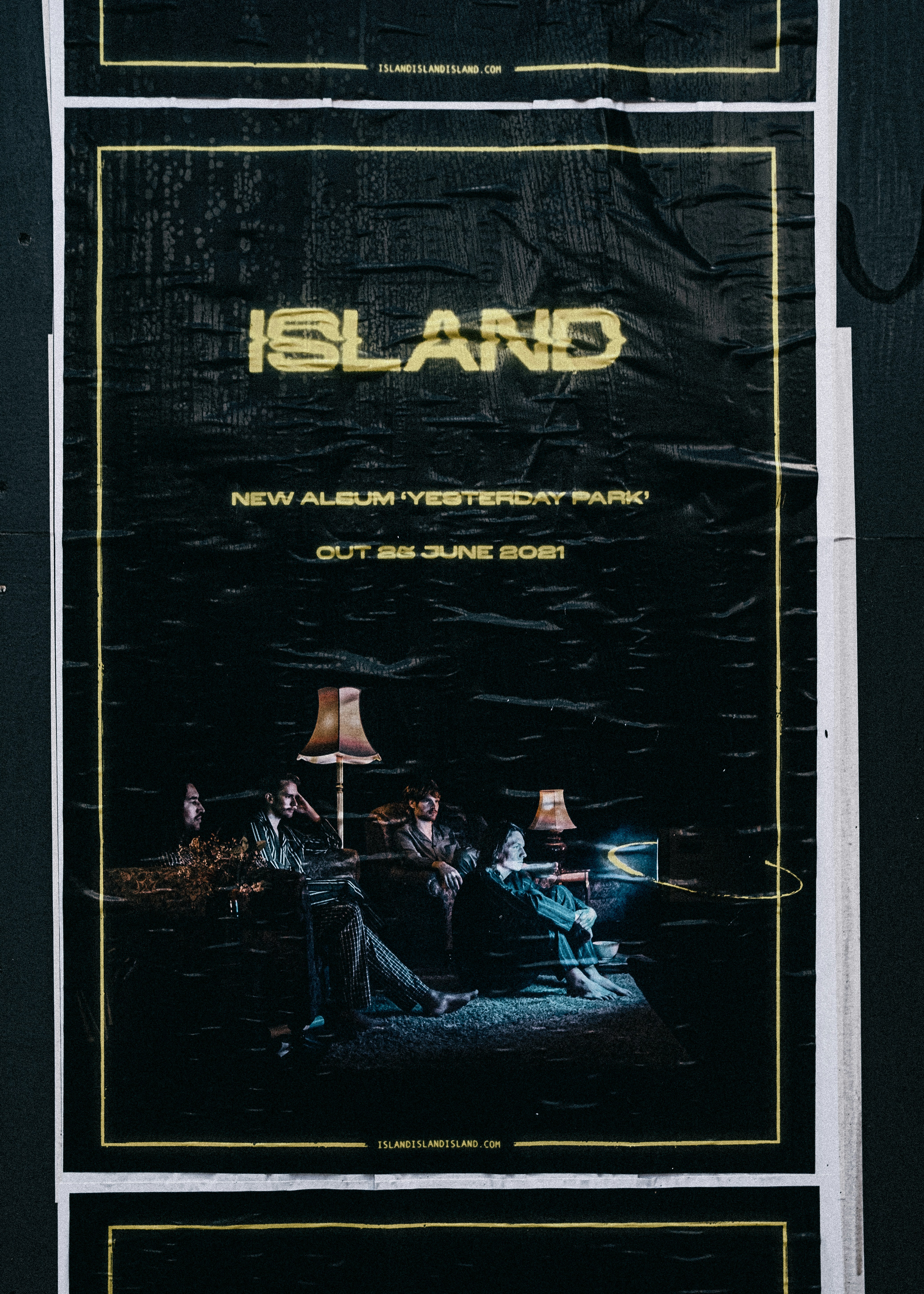 Island Promo Poster: Neon Gold Text and Band Scene