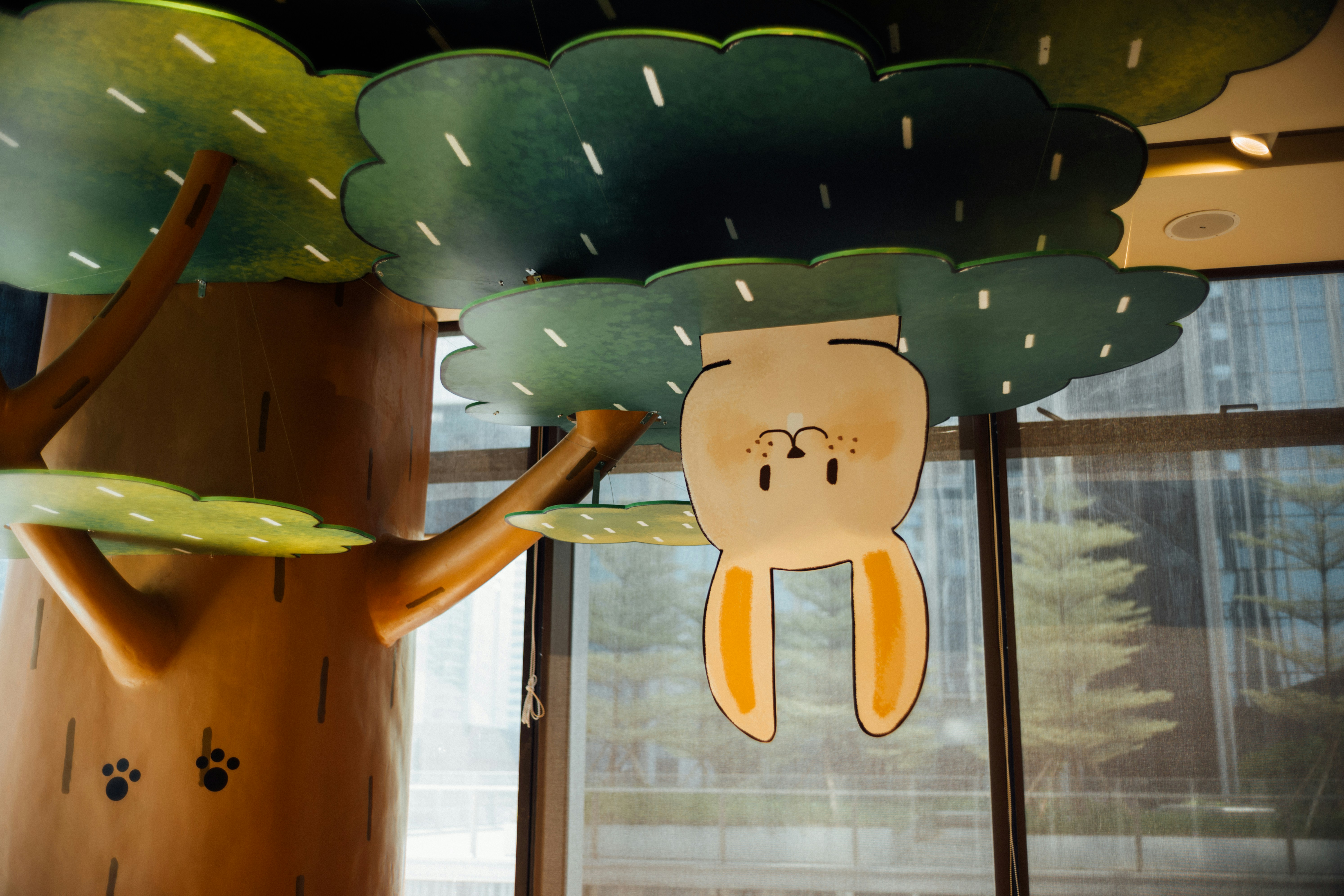 Hanging Bunny in a Playful Canopy
