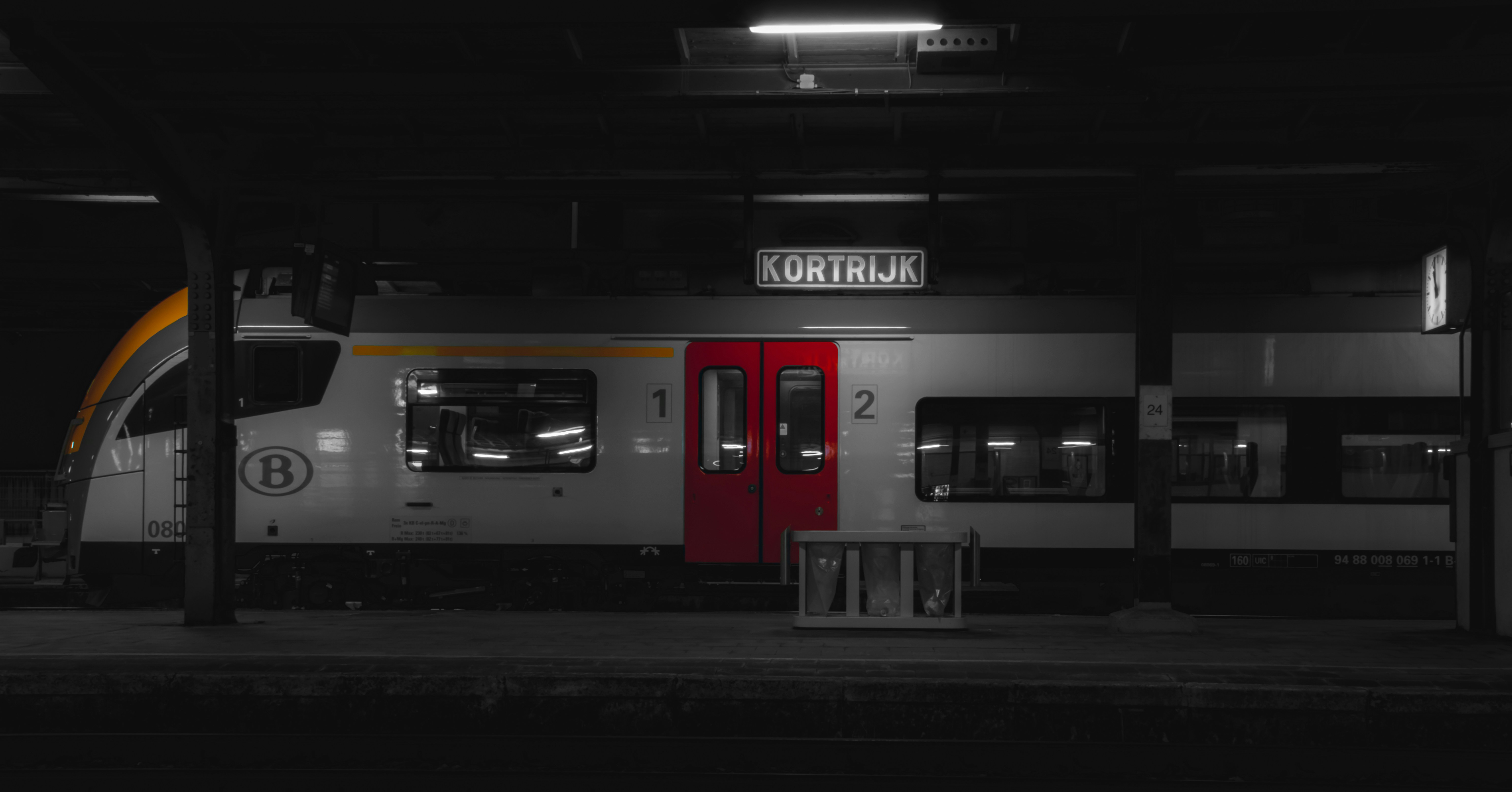 Red Door on a Quiet Platform: Night Train at Kortrijk