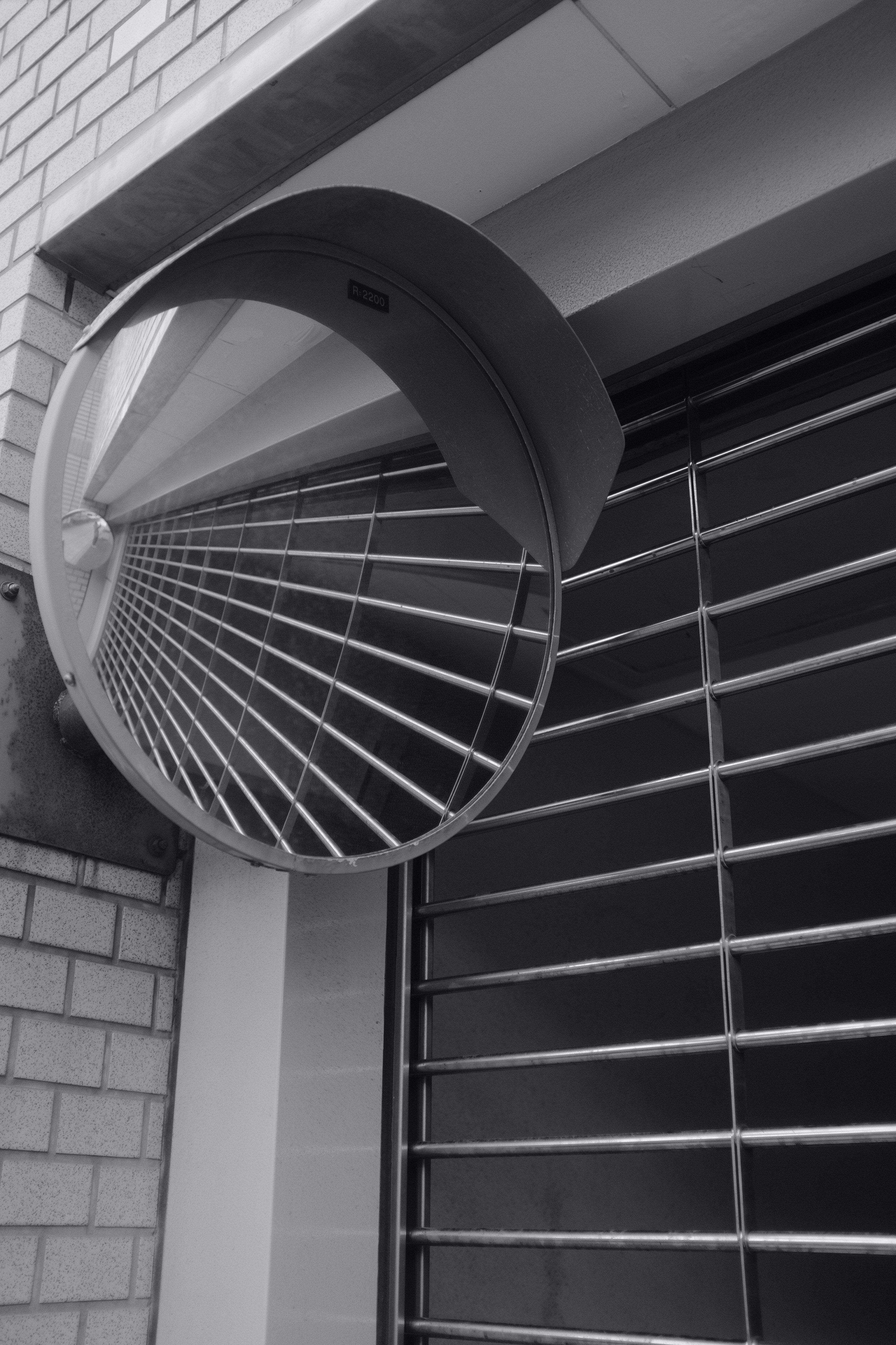 Ringed Vent in Grayscale: A Quiet Study of Urban Geometry