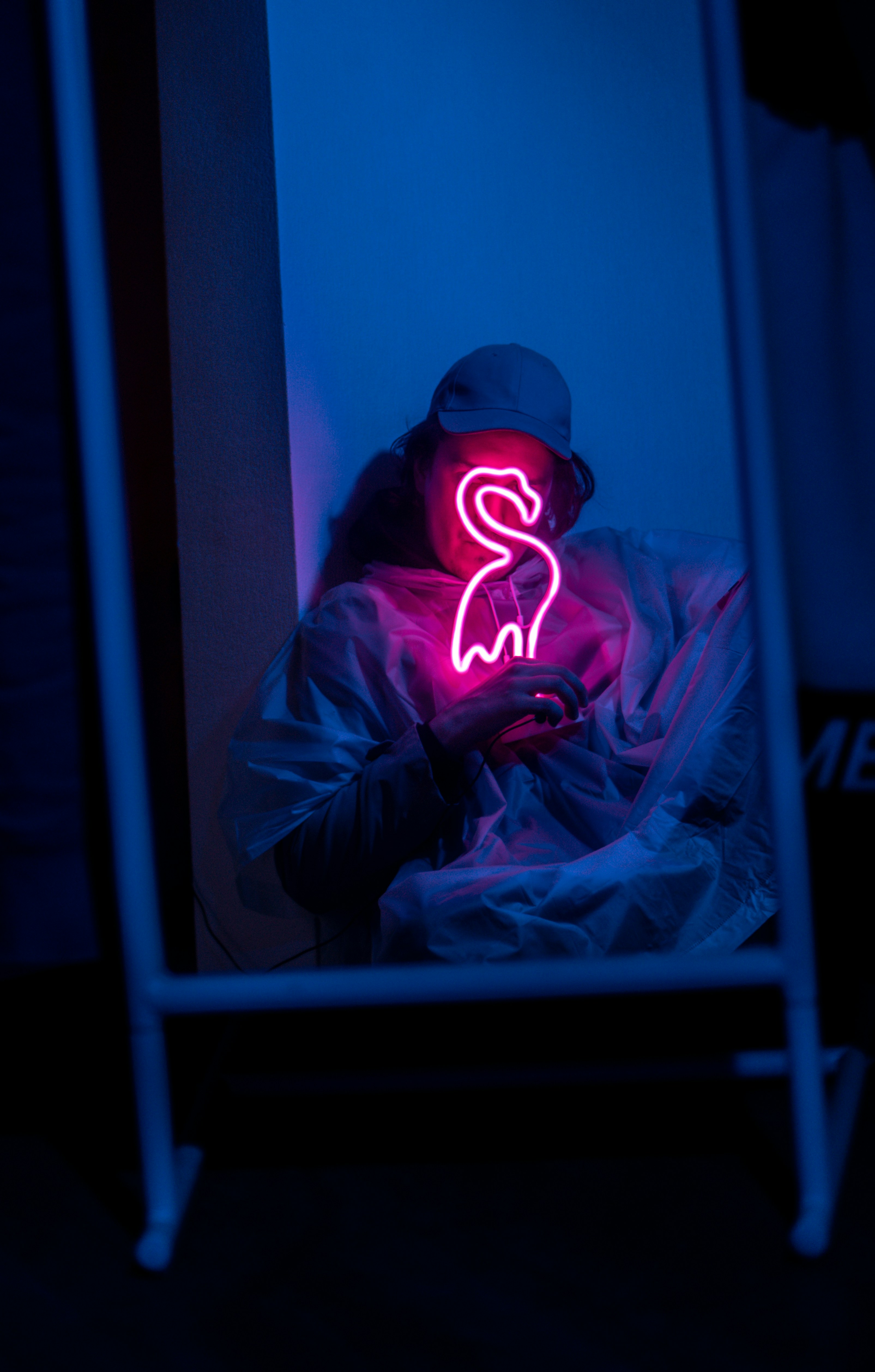 Hazmat Night: Neon Flamingo Sparks Against a Cobalt Glow